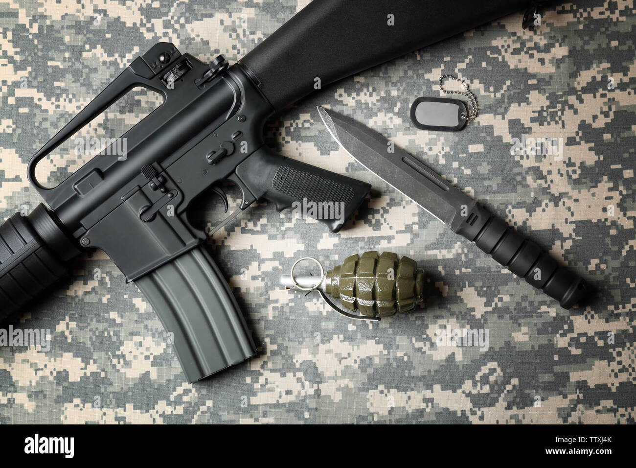 Military set on camouflage clothing Stock Photo - Alamy