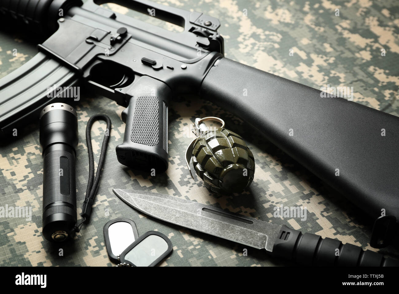 Military set on camouflage clothing Stock Photo - Alamy