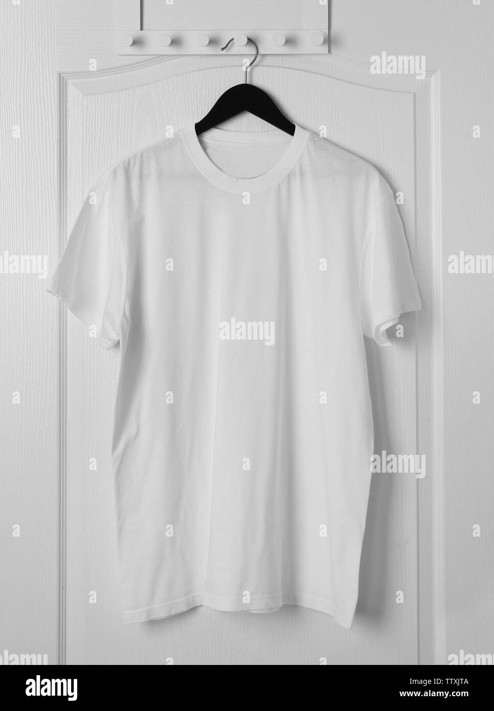 White door hanger on Black and White Stock Photos & Images - Alamy