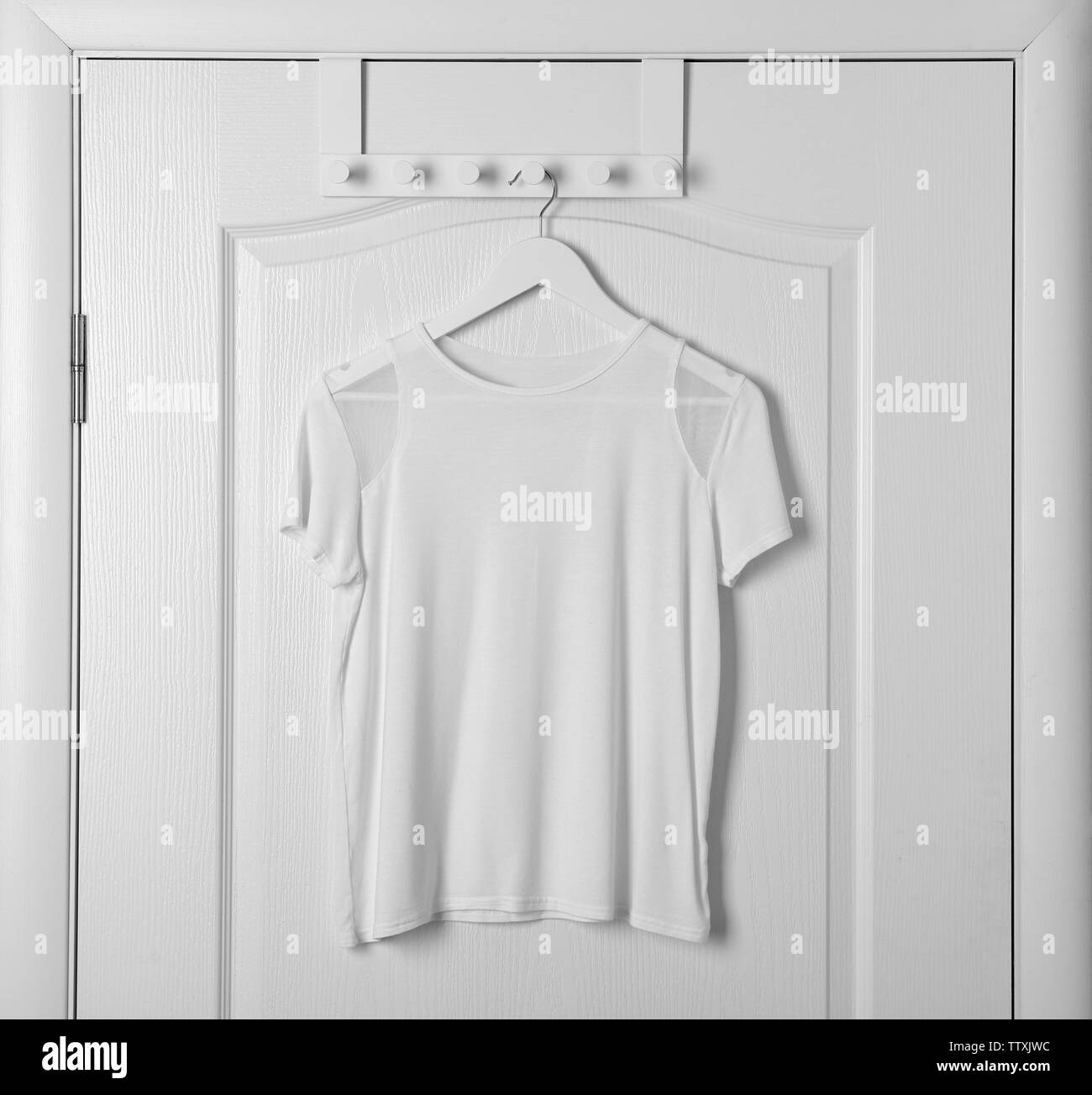 White door hanger on Black and White Stock Photos & Images - Alamy