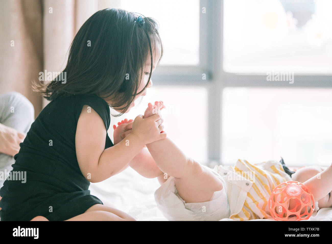 Second child family hi-res stock photography and images - Alamy