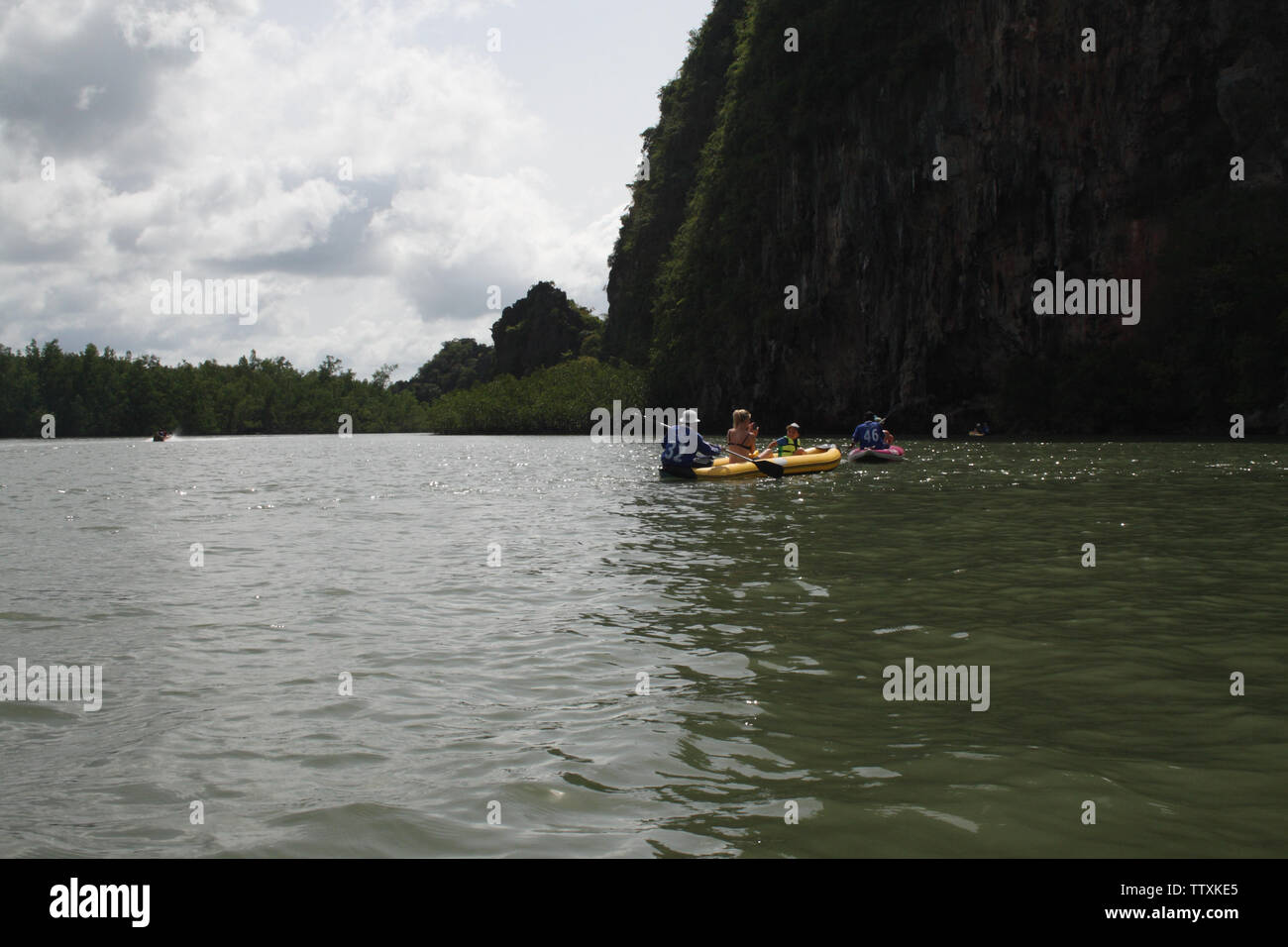 Tourists kayaking in the sea, Panak Island, Phang Nga Bay, Phuket ...