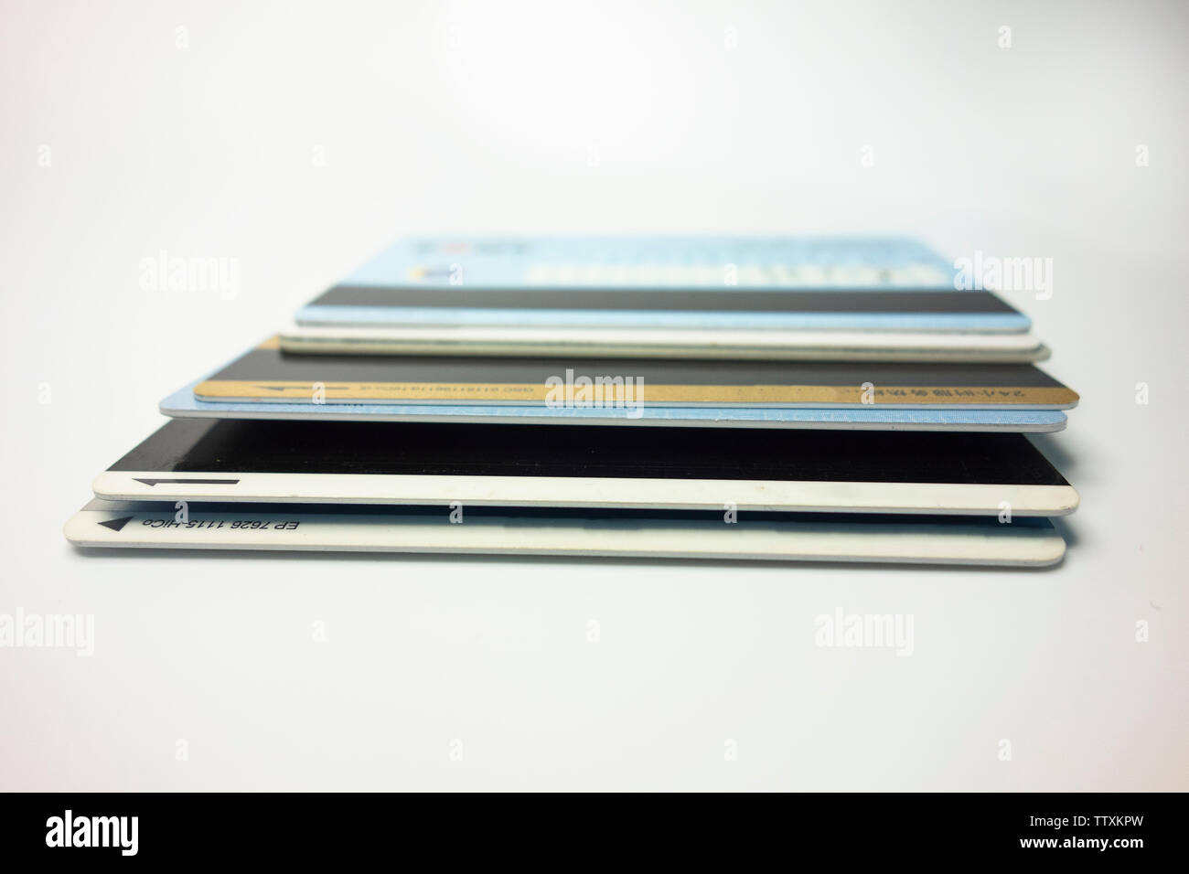 Multiple bank cards stacked together Stock Photo - Alamy