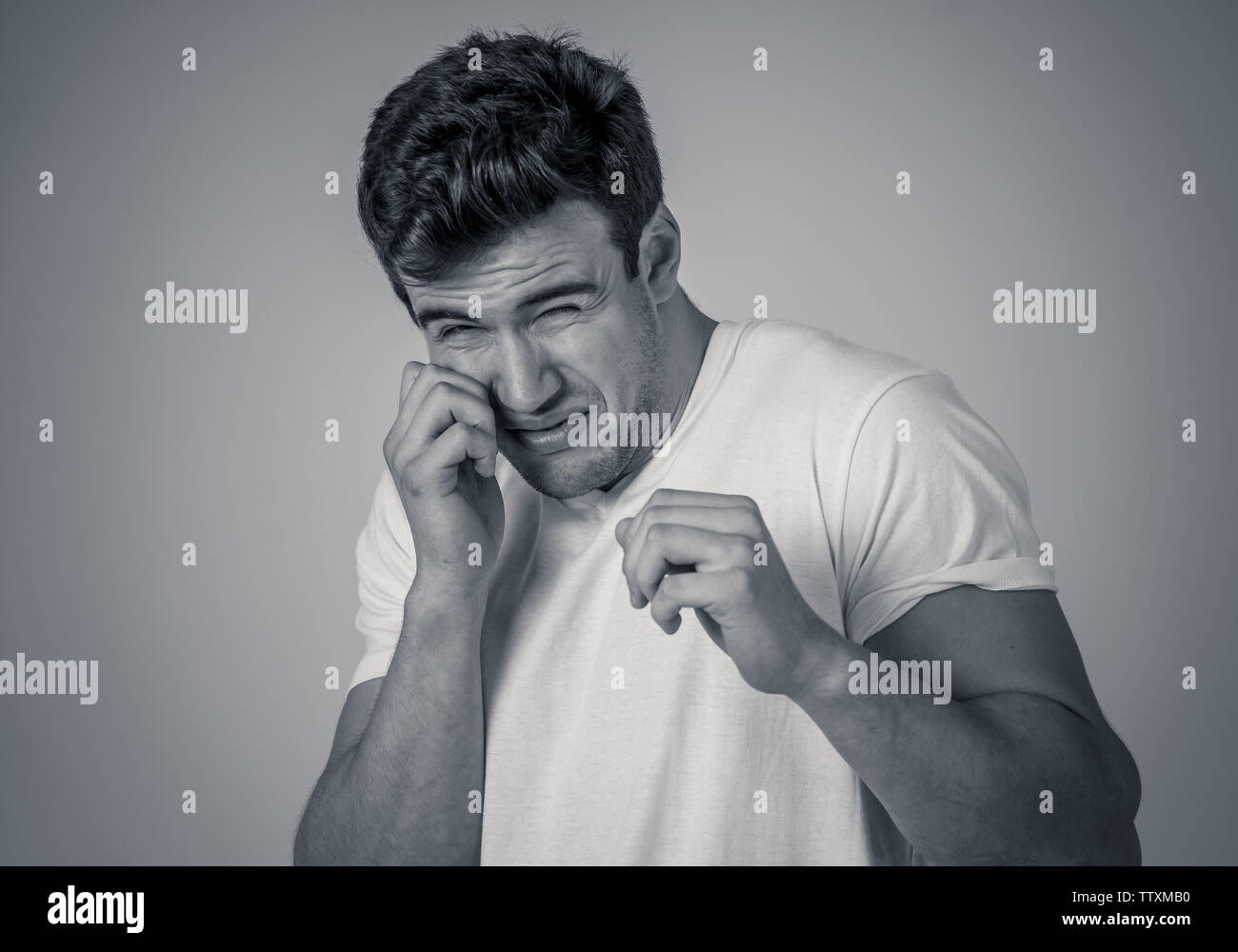 Portrait of Handsome latin young man in shock with a scared expression ...