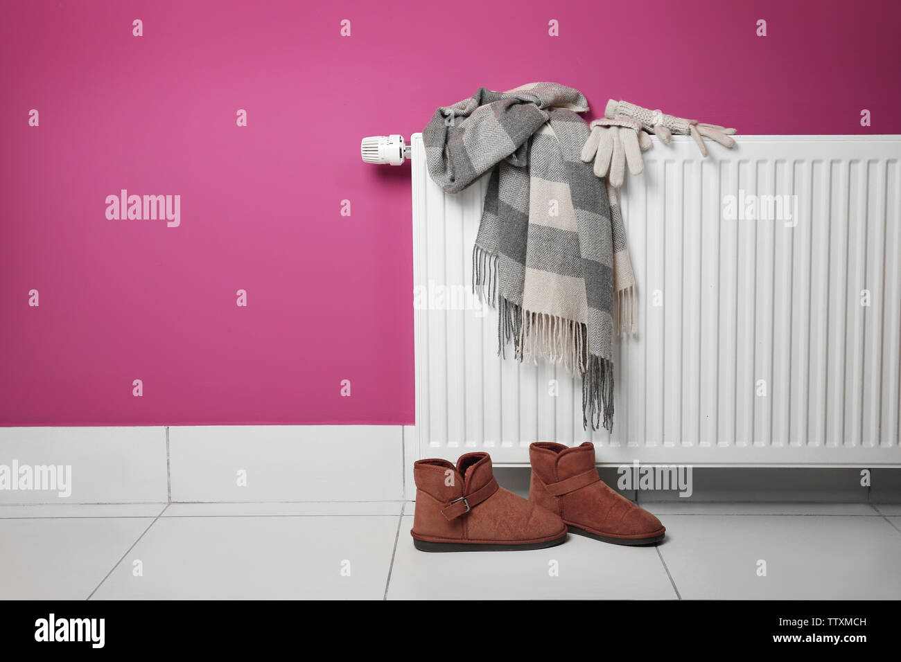 Clothes drying on heater hi-res stock photography and images - Alamy
