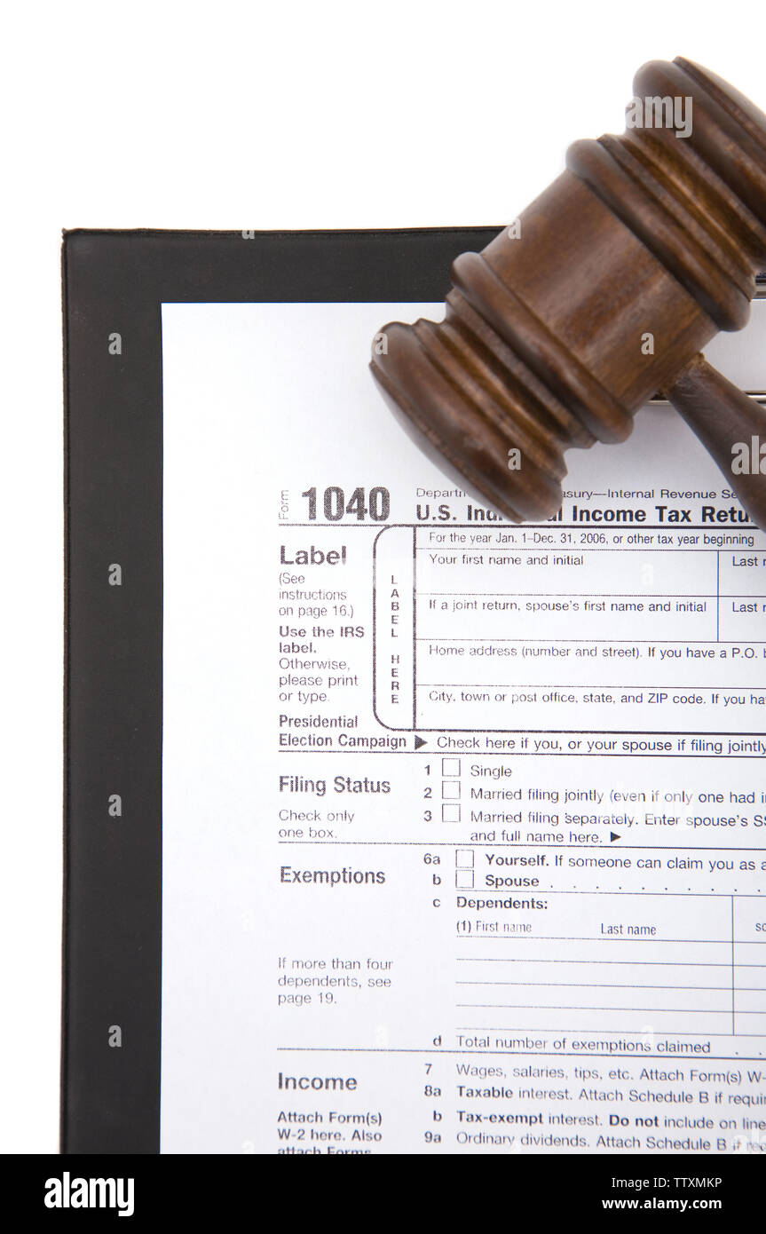 1040 tax form with gavel on white background Stock Photo - Alamy
