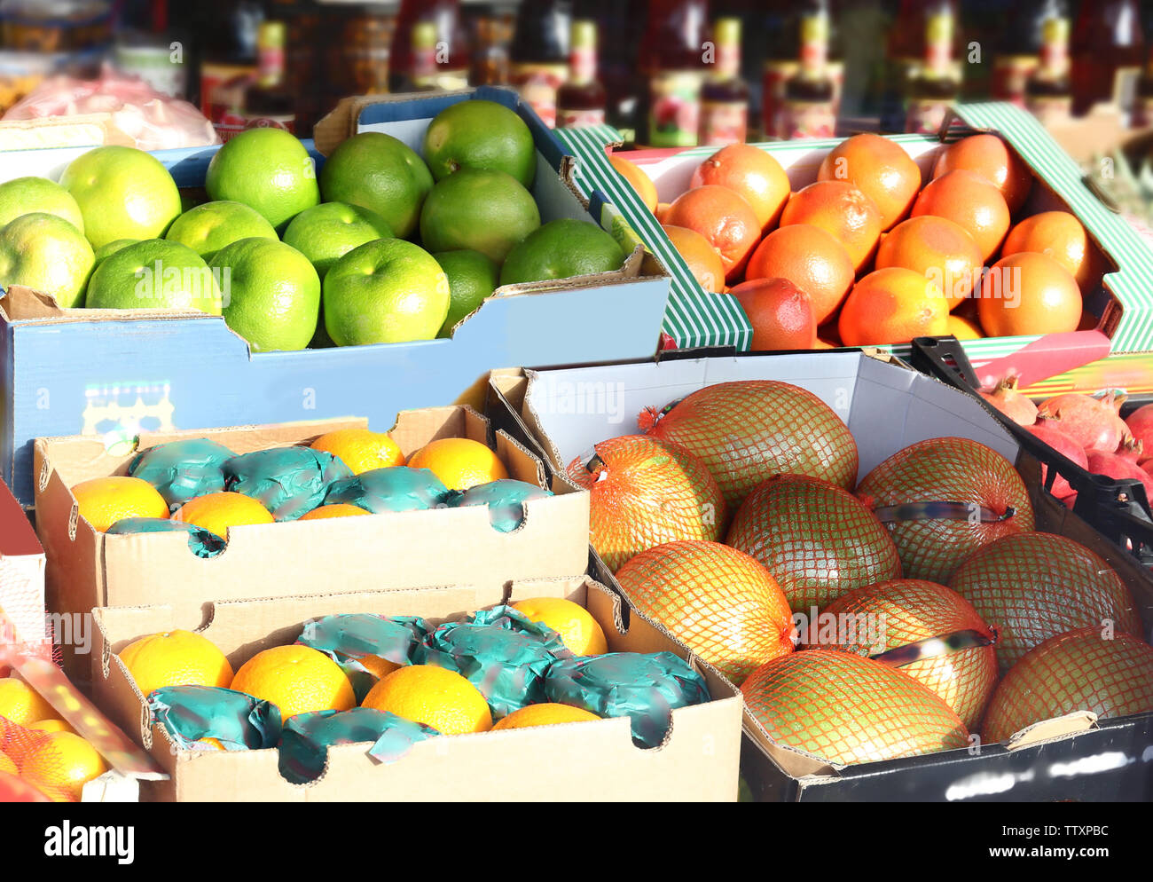 Fresh fruits in boxes on market Stock Photo - Alamy