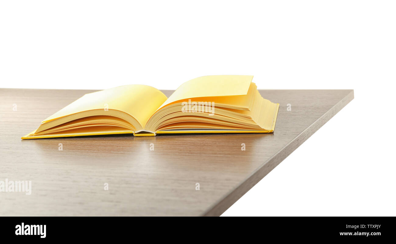 Open book on wooden table Stock Photo - Alamy