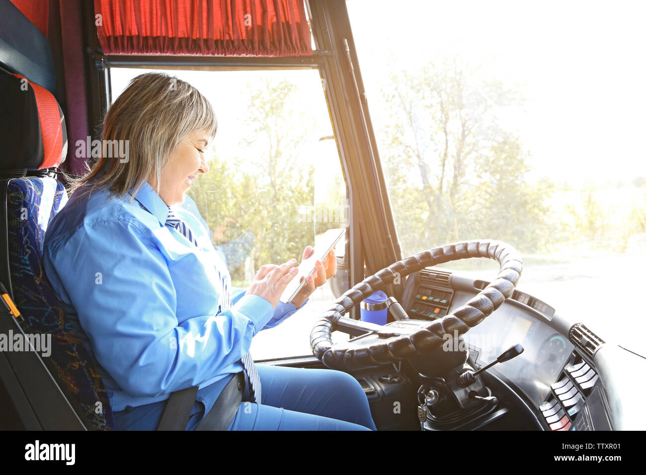 Female school bus driver hi-res stock photography and images - Alamy