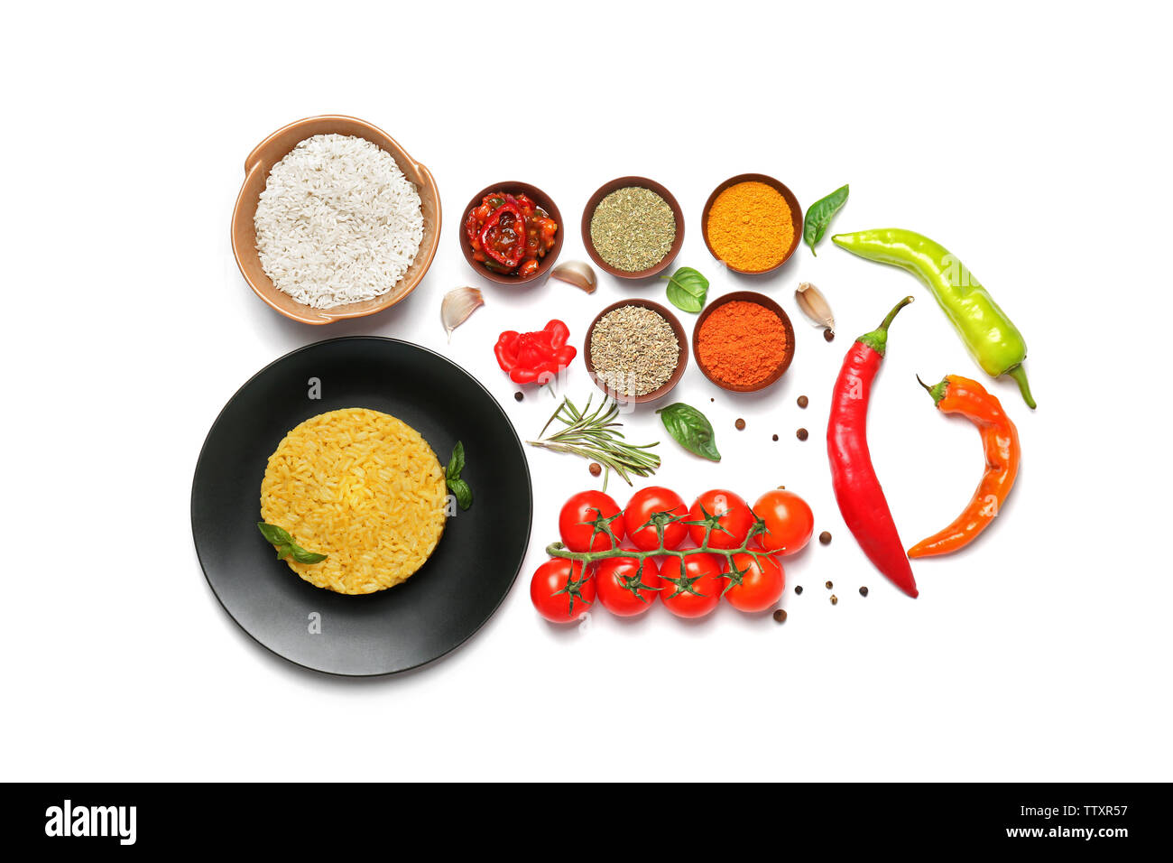 Cooking concept. Food ingredients and cooked rice on white background ...