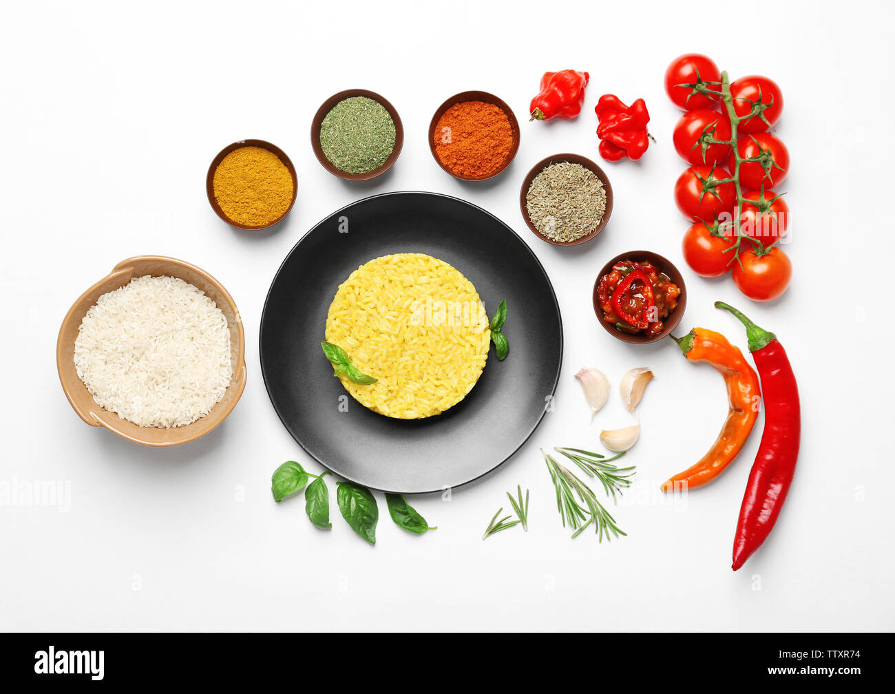 Cooking concept. Food ingredients and cooked rice on white background ...