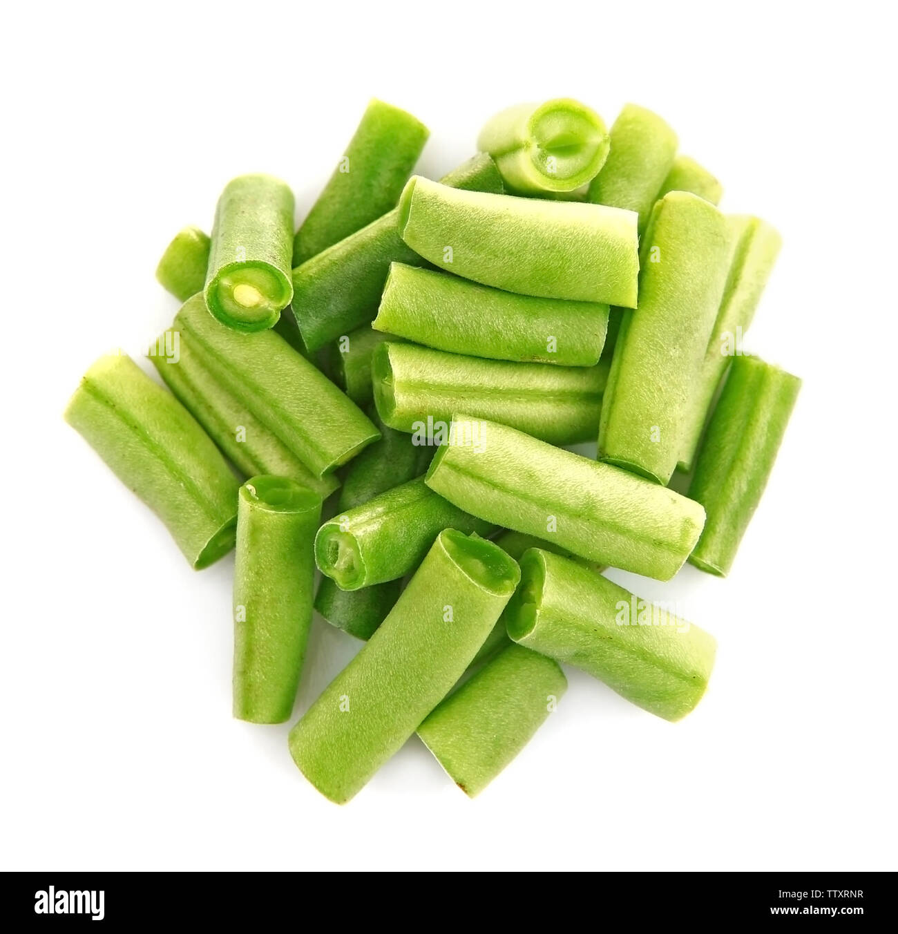 Chopped French beans on white background Stock Photo - Alamy