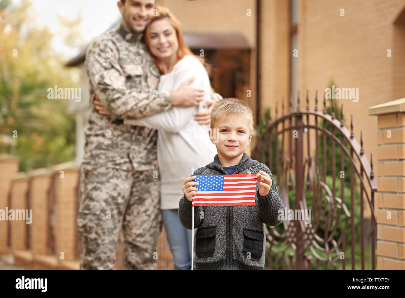 Handsome soldier reunited family hi-res stock photography and images ...