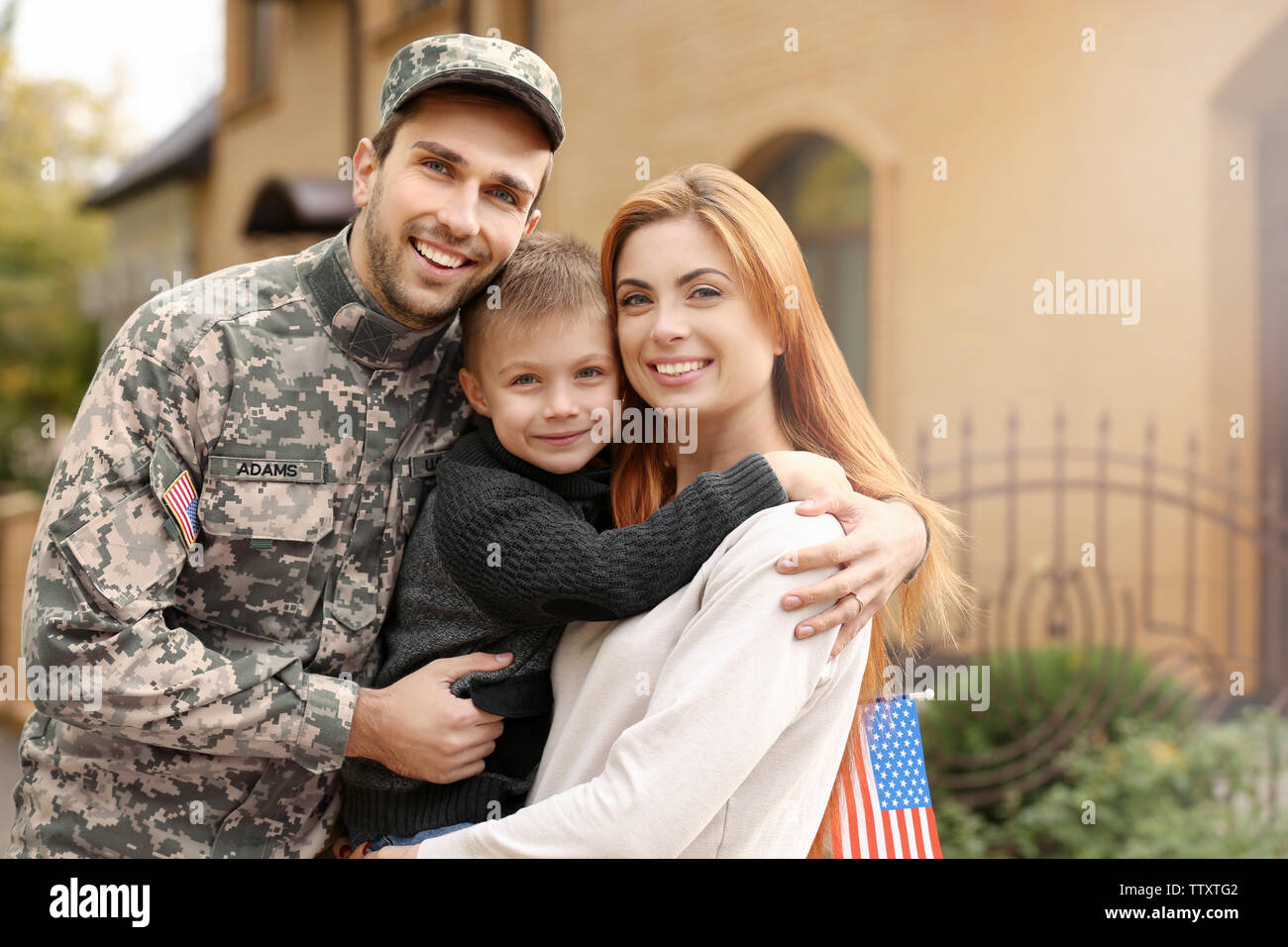 Handsome soldier reunited family hi-res stock photography and images ...
