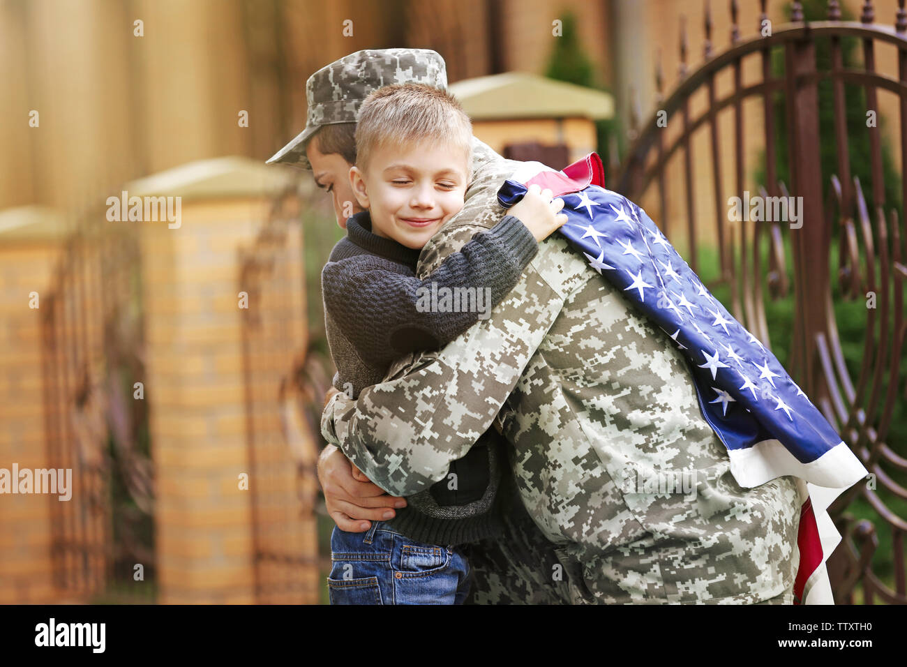 Handsome soldier reunited family hi-res stock photography and images ...