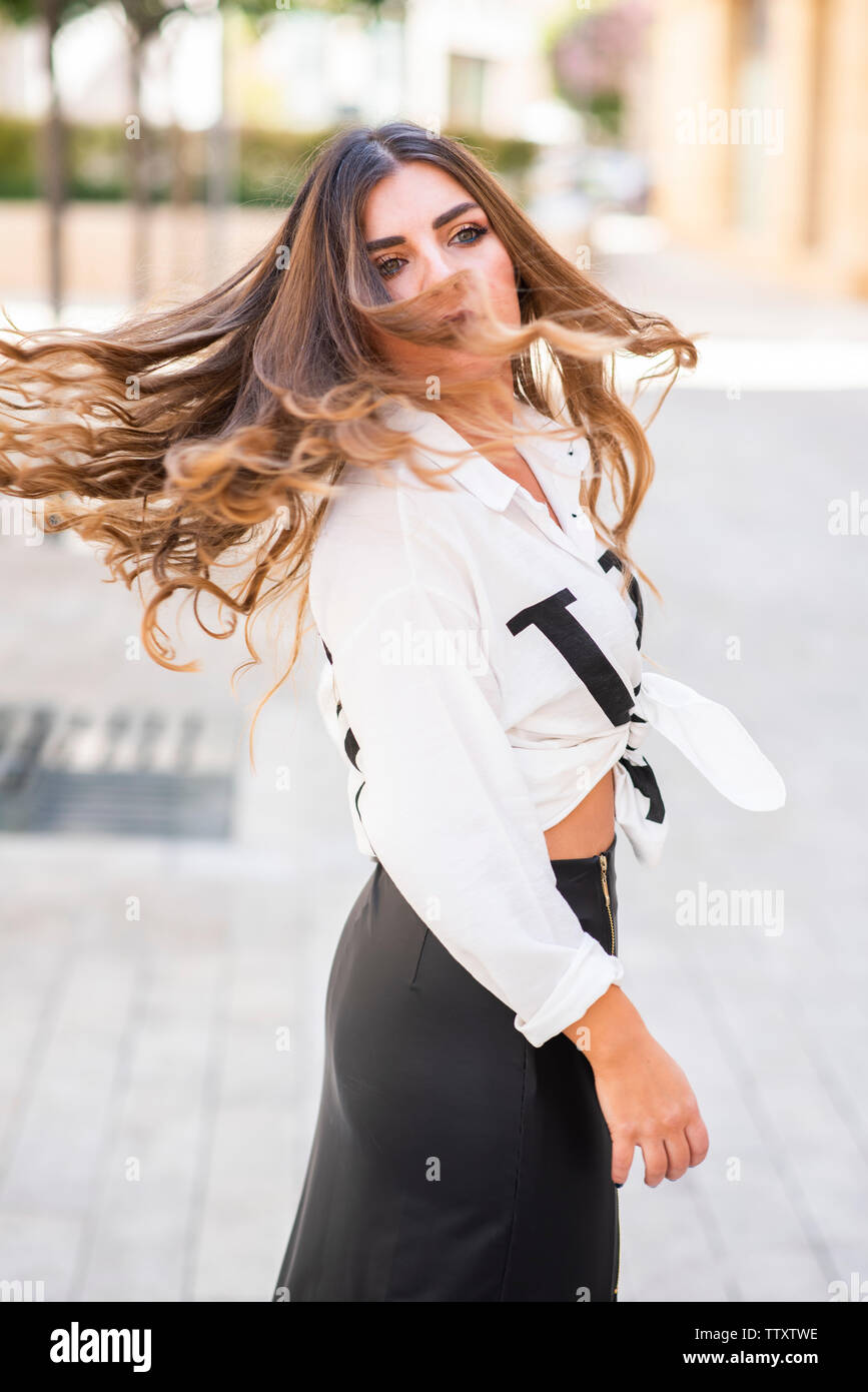 Scared young woman being chased Stock Photo - Alamy