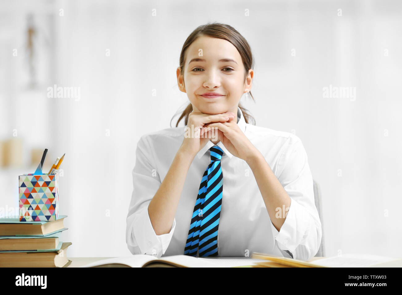 Student studying in classroom Stock Photo - Alamy