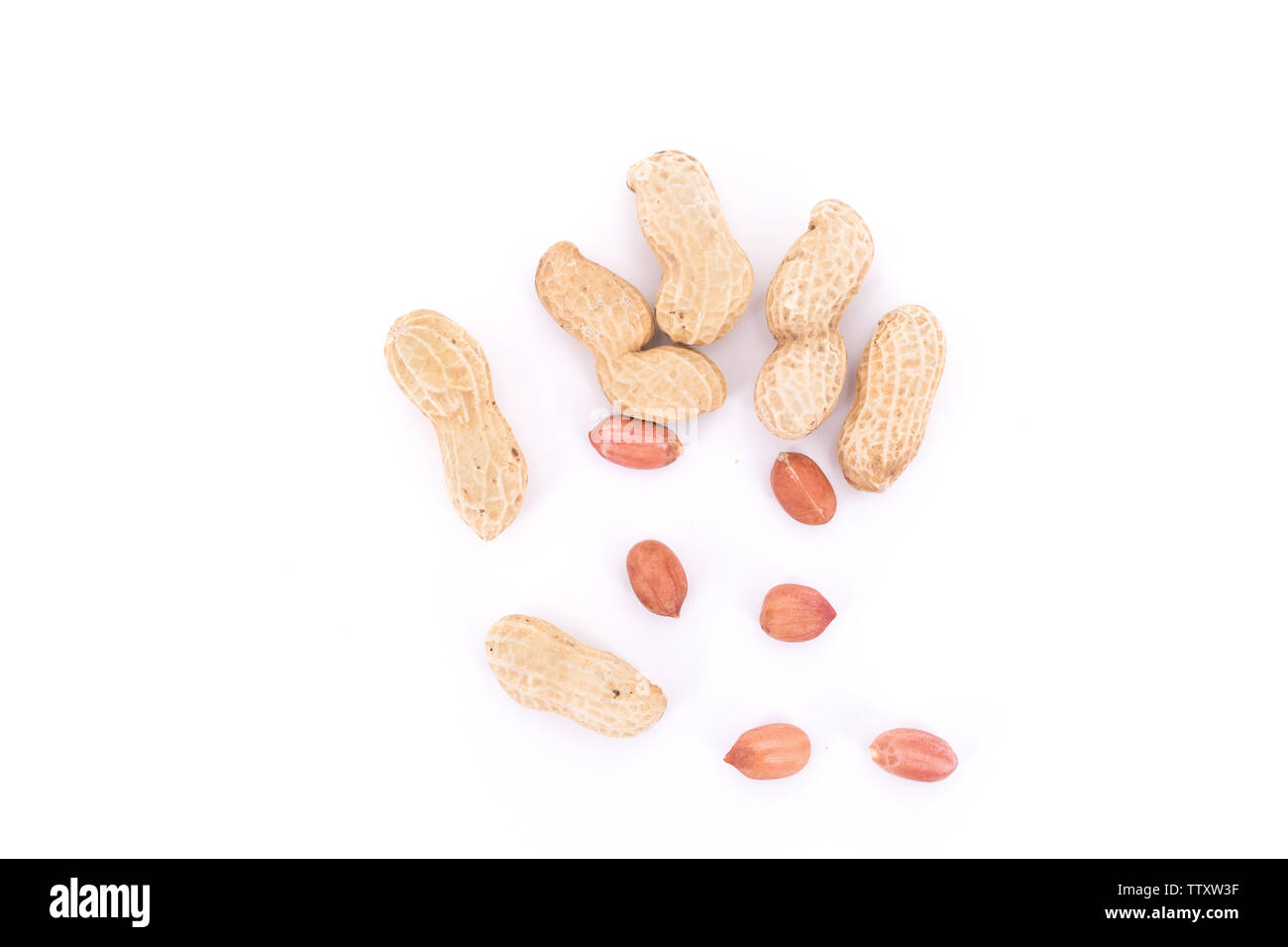 Peanuts on white background Stock Photo - Alamy