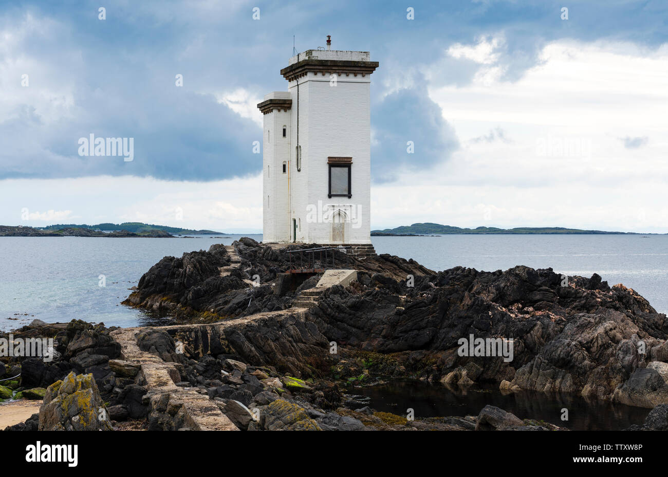 Port Ellen Lighthouse at Carraig Fhada on Islay in Inner Hebrides ...