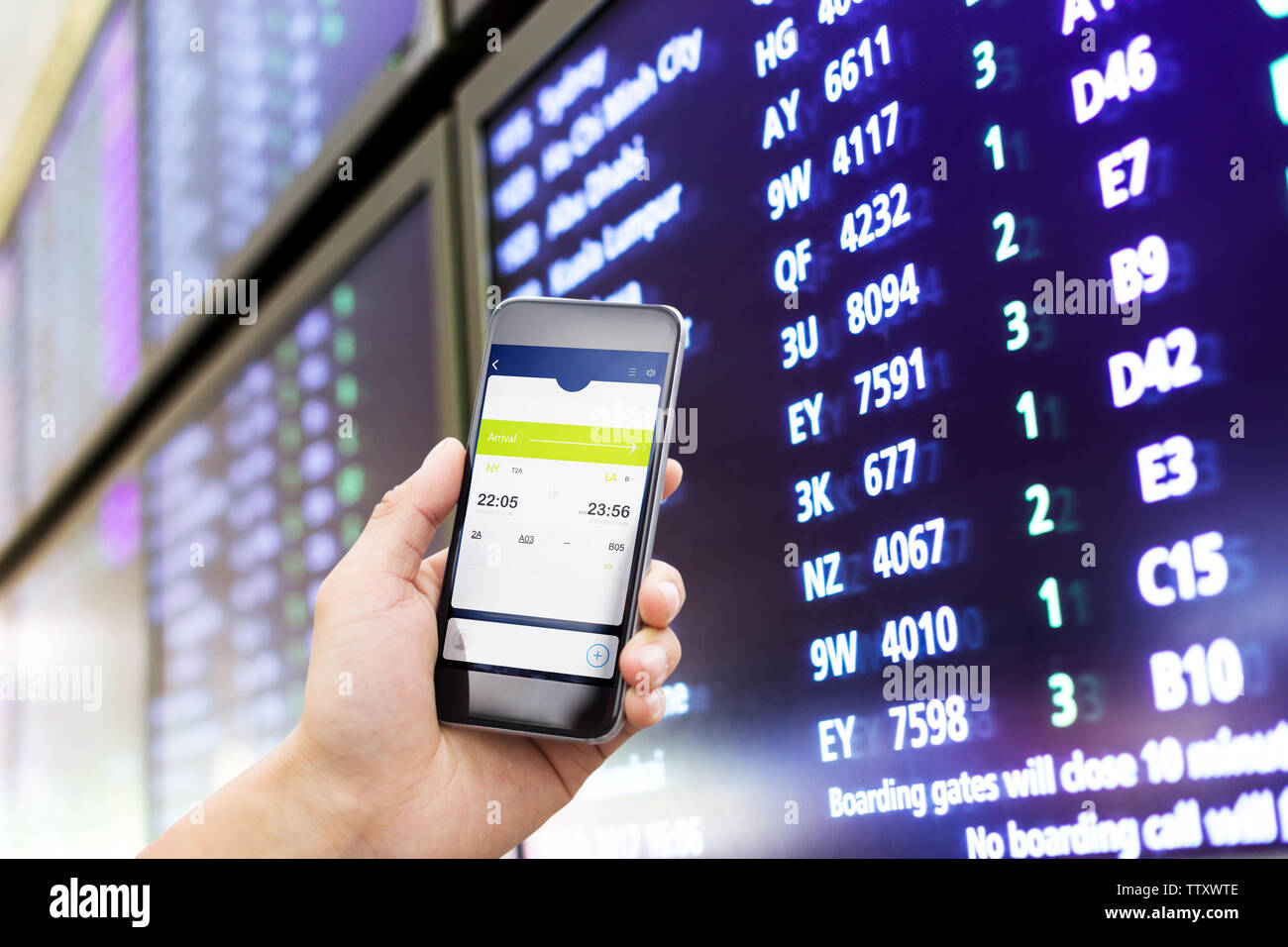 Mobile phone with screen in airport Stock Photo - Alamy