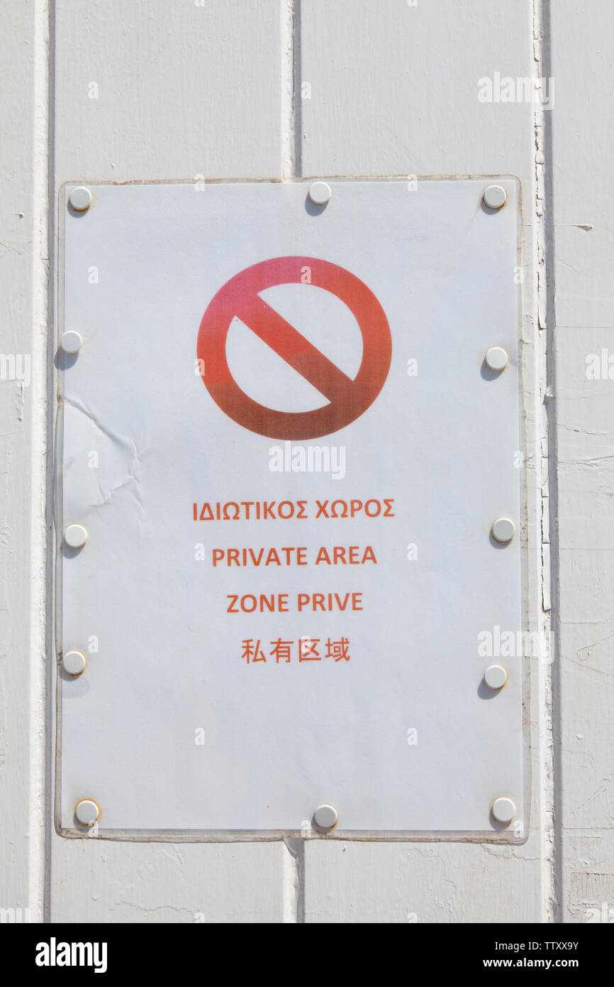 Private area Zone Prive printed laminated sign posted on white wooden ...