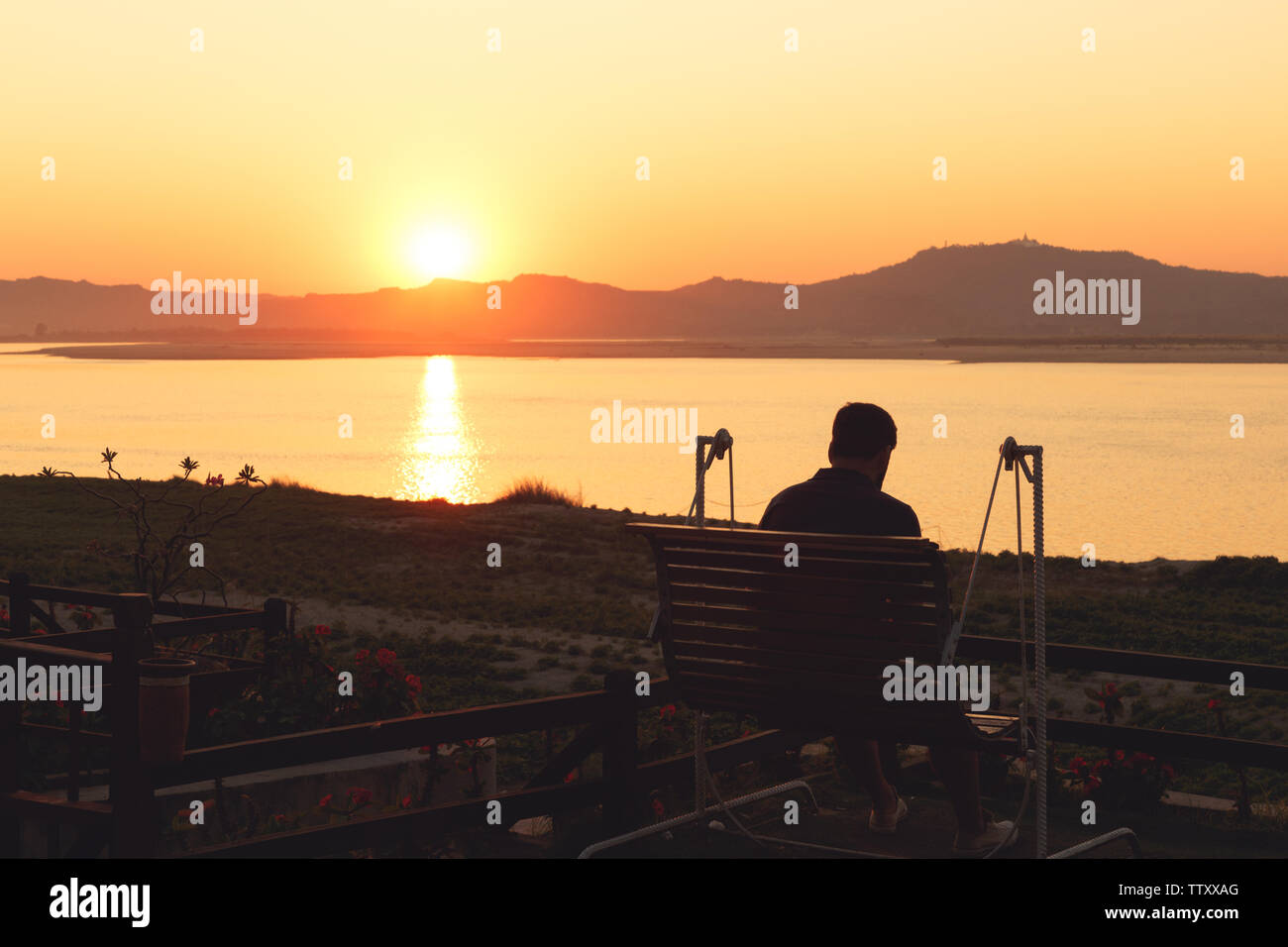Sunset by the Pugan River Stock Photo - Alamy