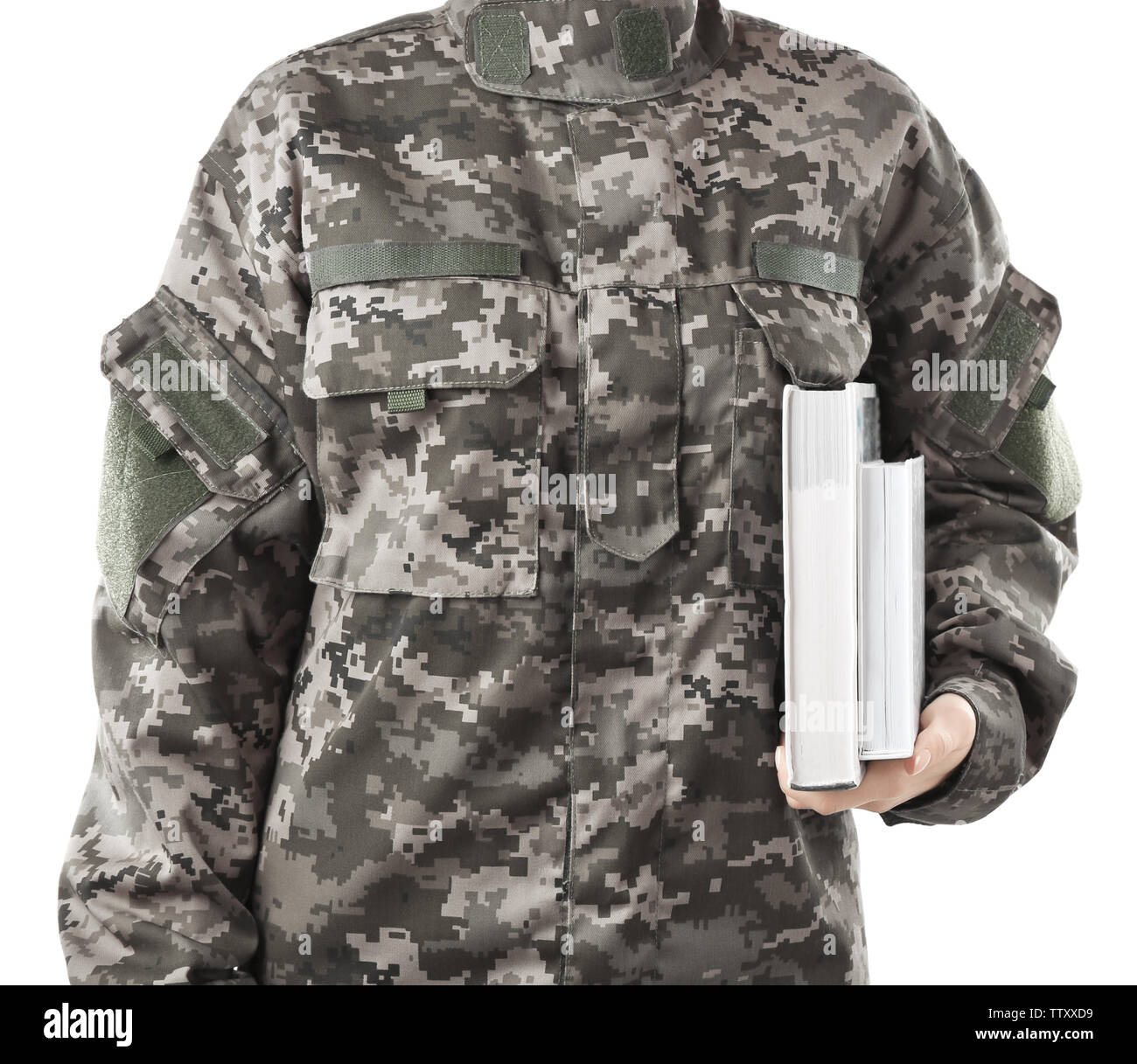 Soldier holding books. Military education concept Stock Photo - Alamy