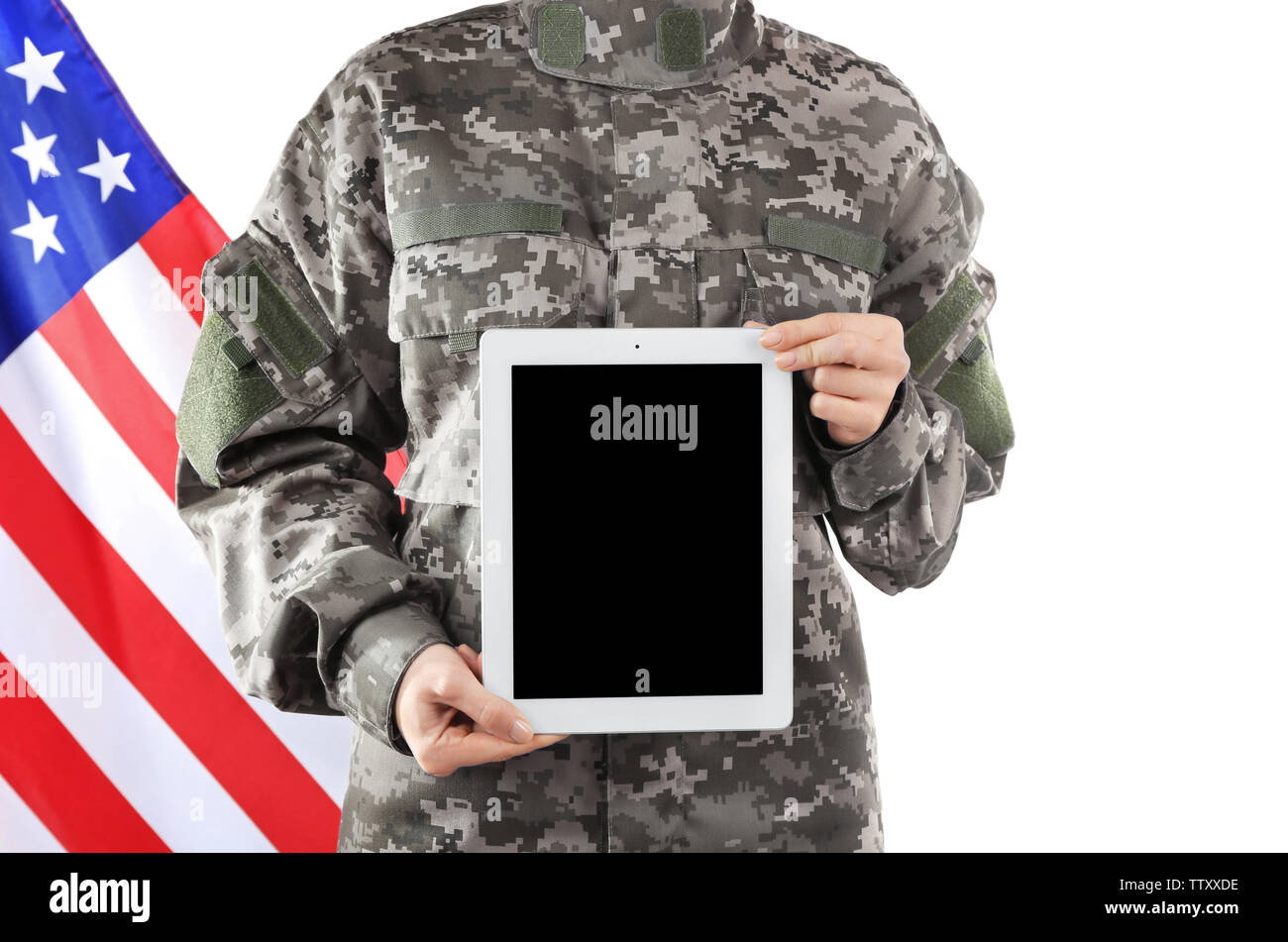 Soldier holding tablet. Military education concept Stock Photo - Alamy