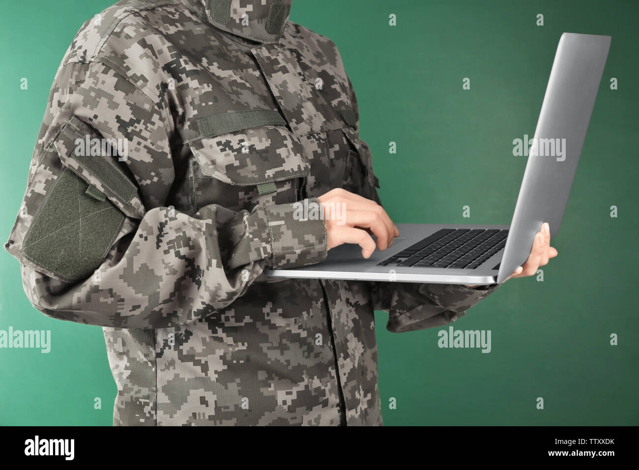 Camouflage soldier laptop hi-res stock photography and images - Alamy