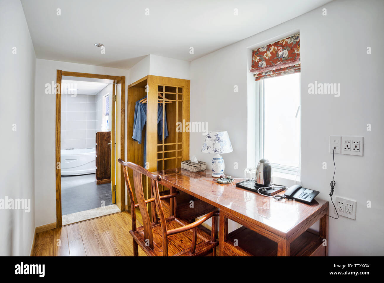 Study room with chair and desk Stock Photo - Alamy