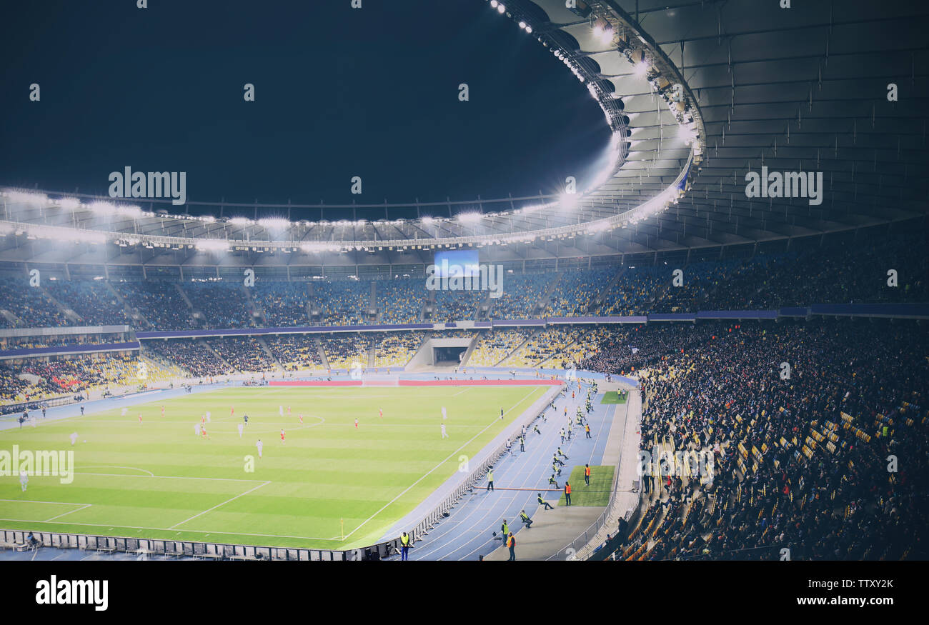 Panoramic view of modern stadium during football match Stock Photo - Alamy