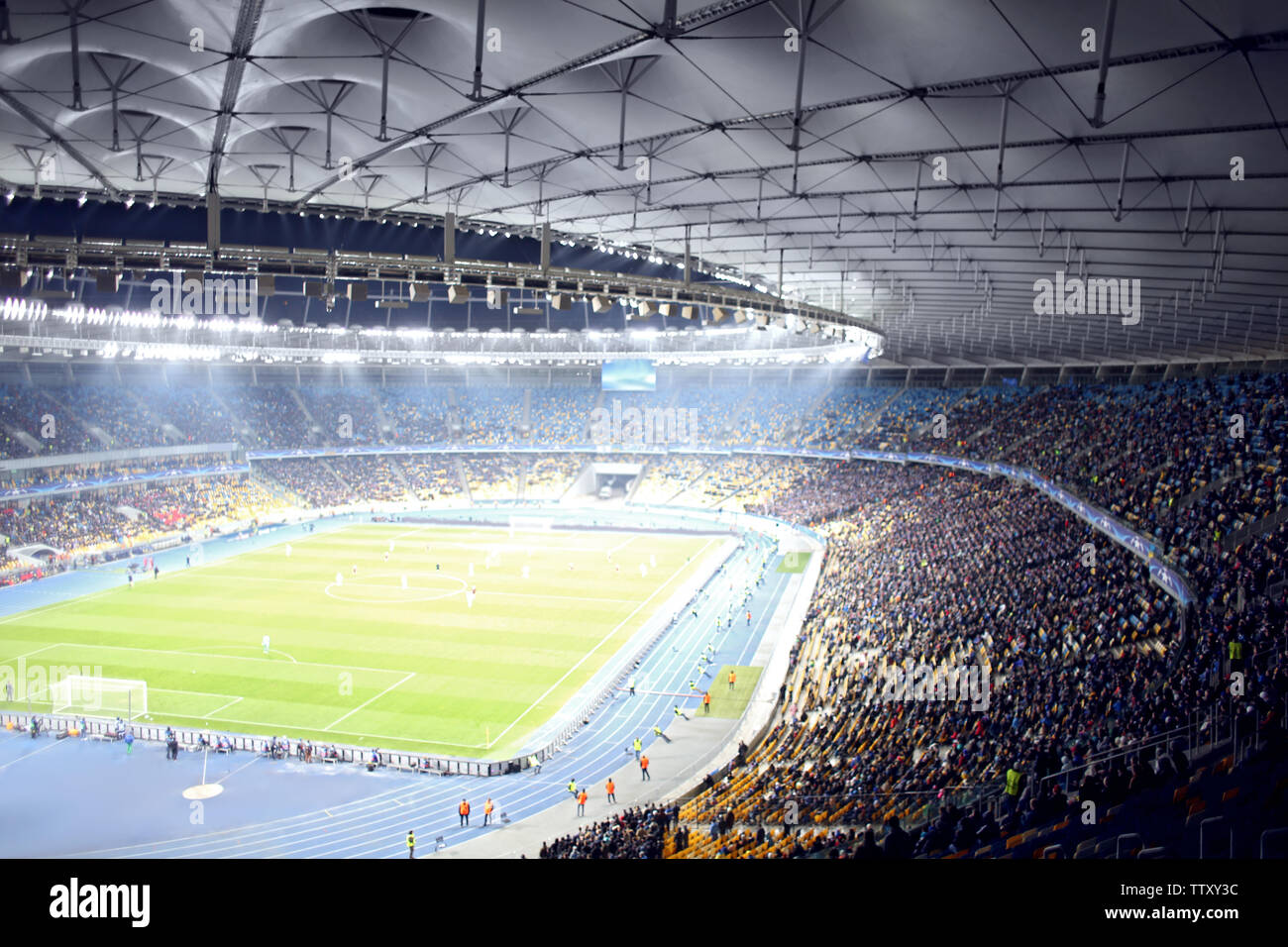 Panoramic view of modern stadium during football match Stock Photo - Alamy