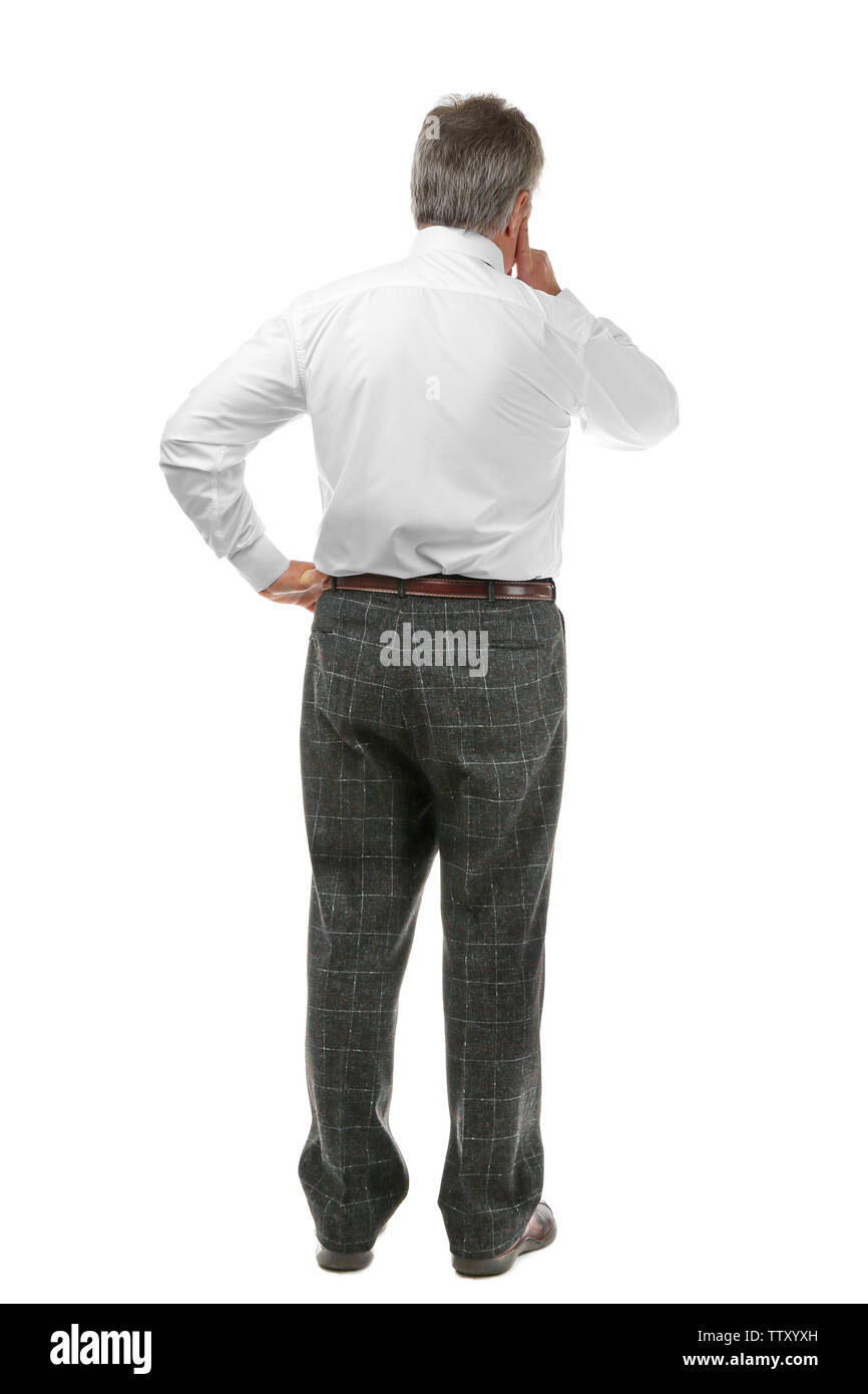 Senior businessman standing back on white background Stock Photo - Alamy