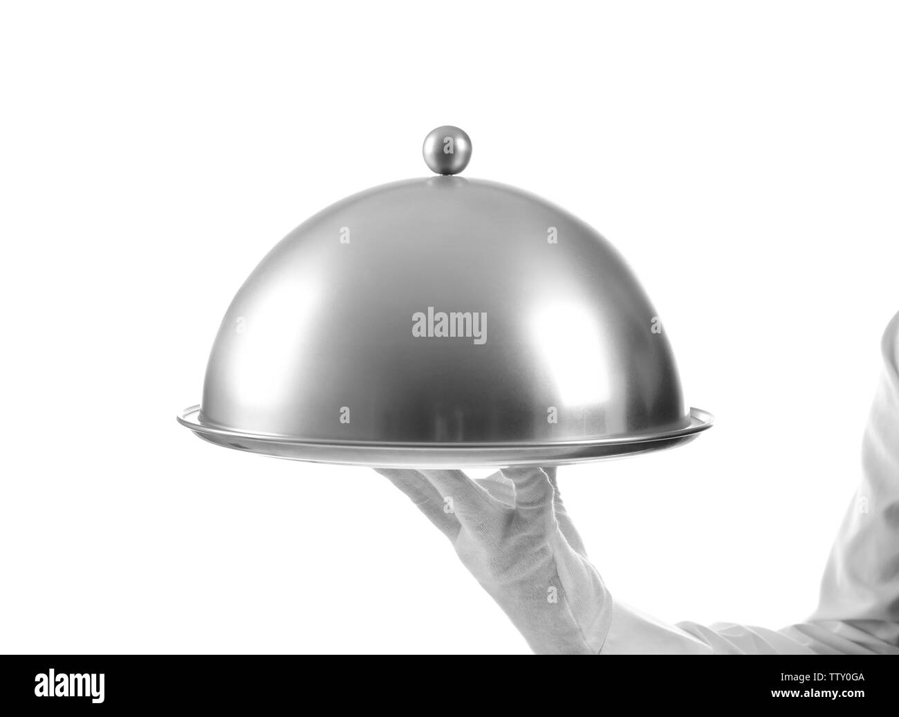 Male waiter holding cloche and tray on white background Stock Photo - Alamy