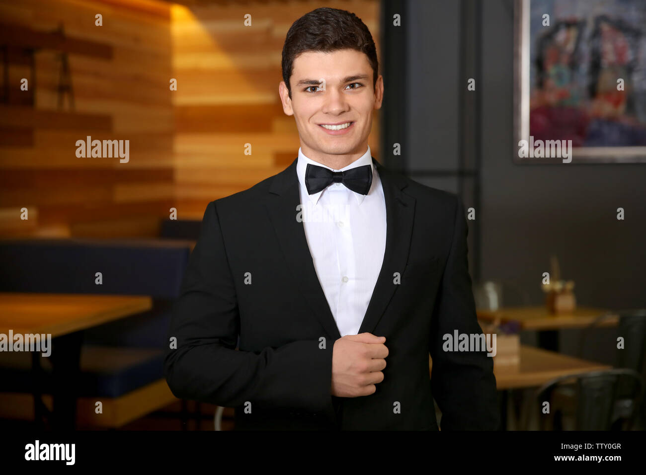 Formal waiter in black hi-res stock photography and images - Alamy