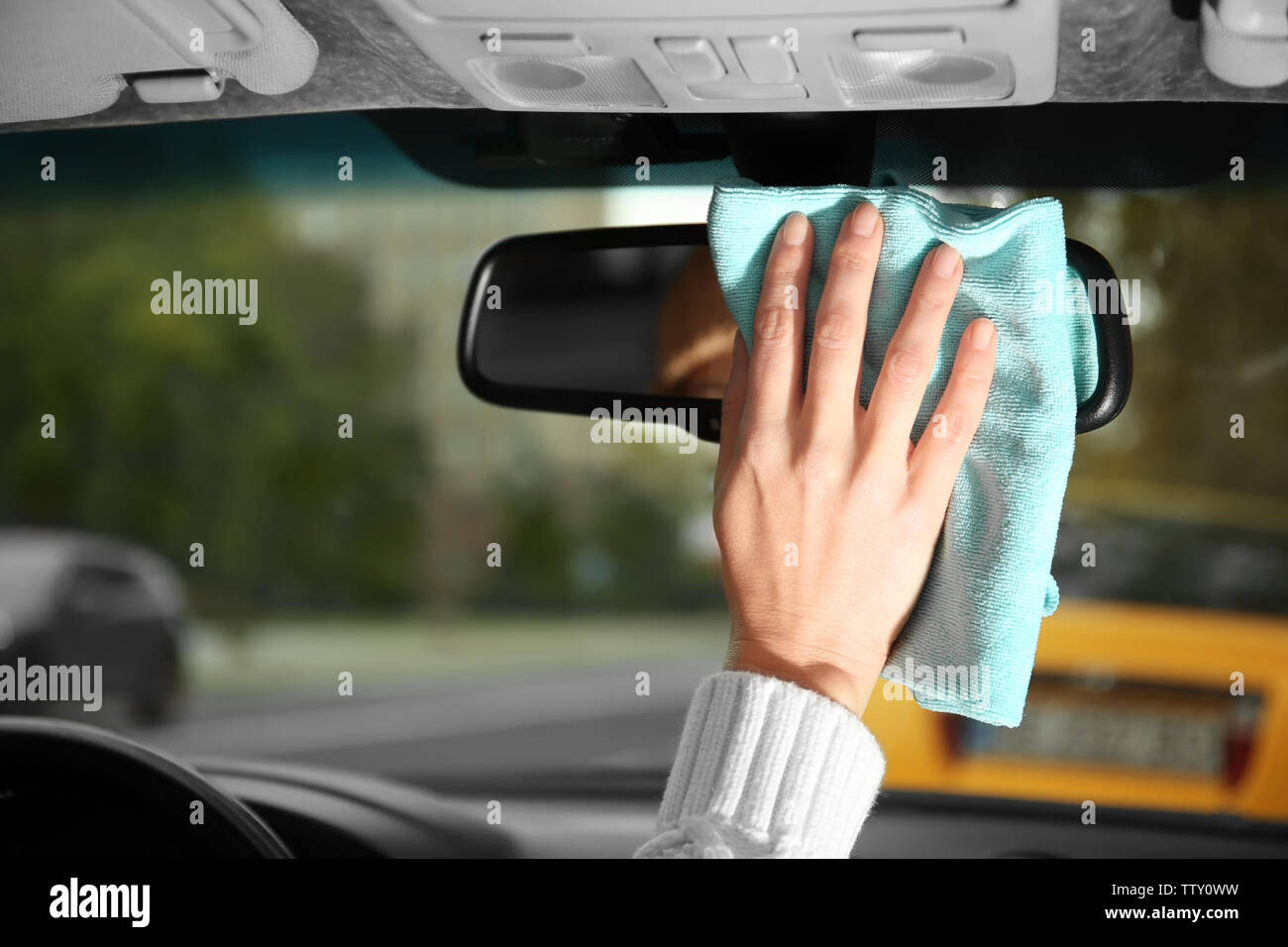 Woman cleaning car dashboard hi-res stock photography and images - Alamy