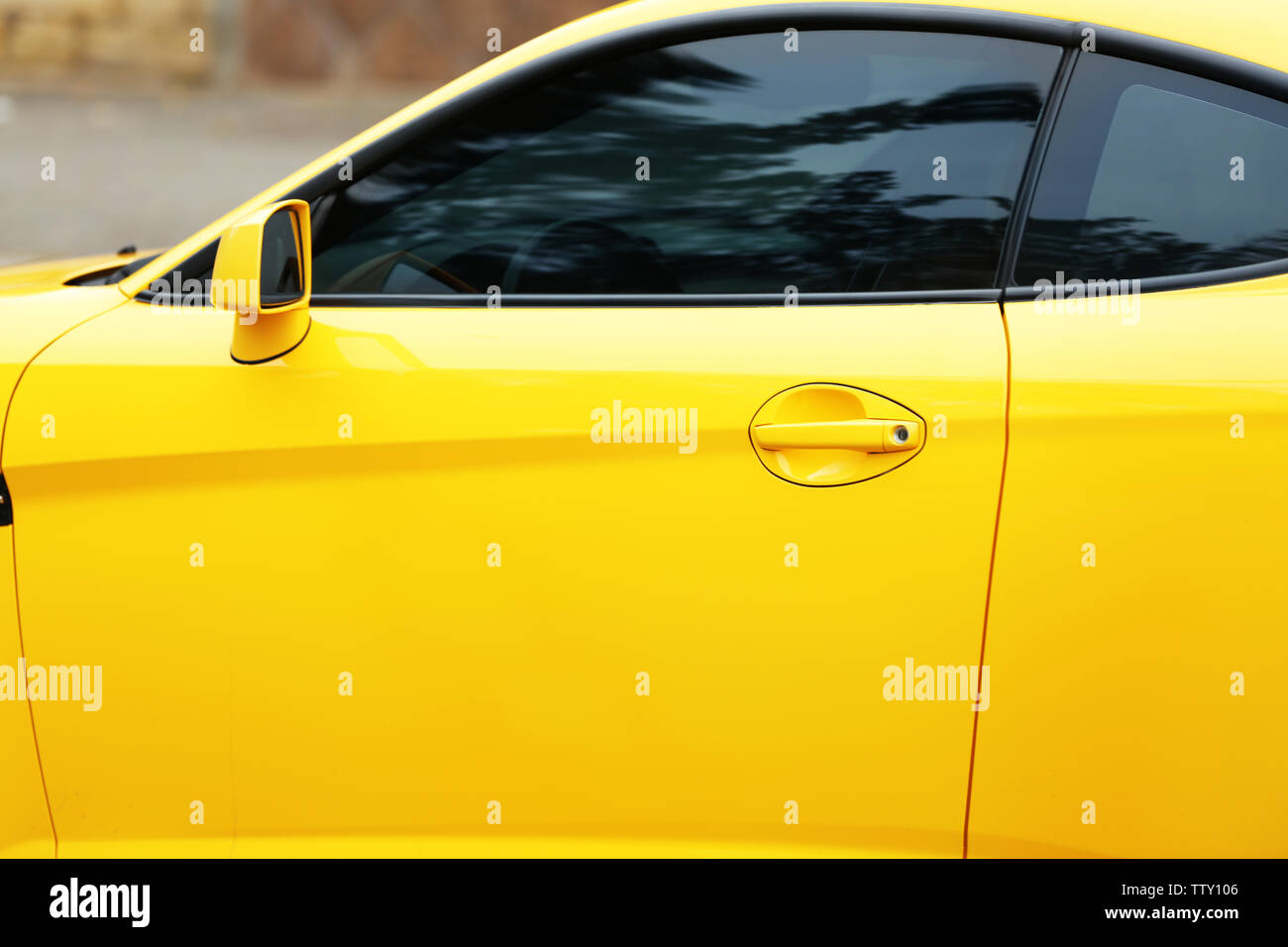 Modern yellow car, outdoor Stock Photo - Alamy