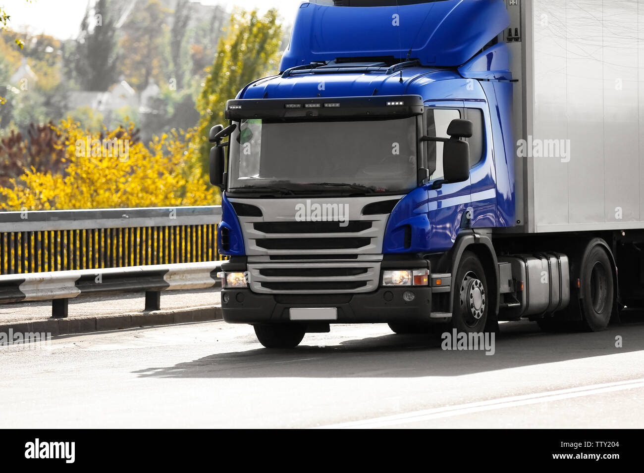 Front of blue American cargo truck Stock Photo - Alamy