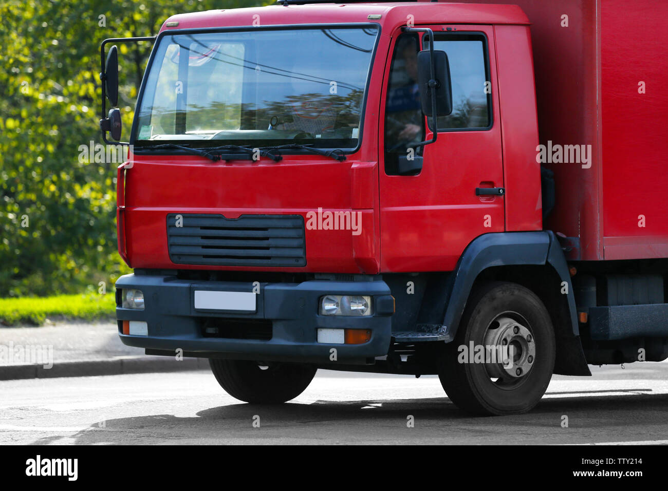 Front of red American cargo truck Stock Photo - Alamy