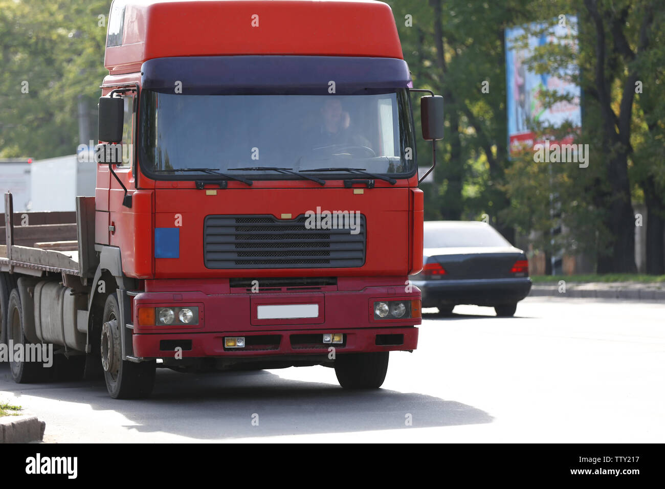 Front of red American cargo truck Stock Photo - Alamy