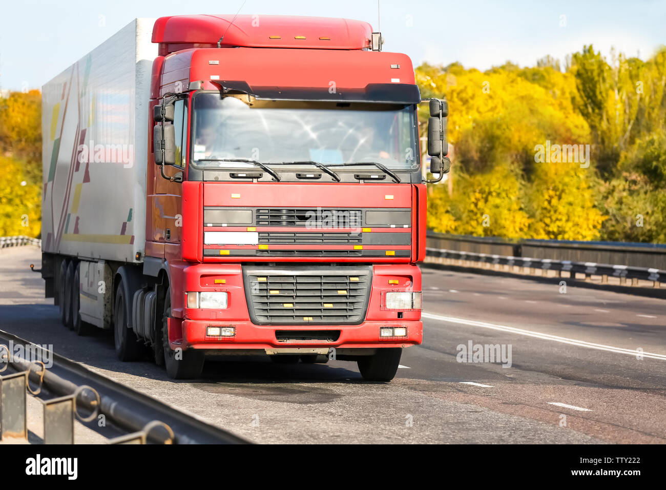 Front of red American cargo truck Stock Photo - Alamy