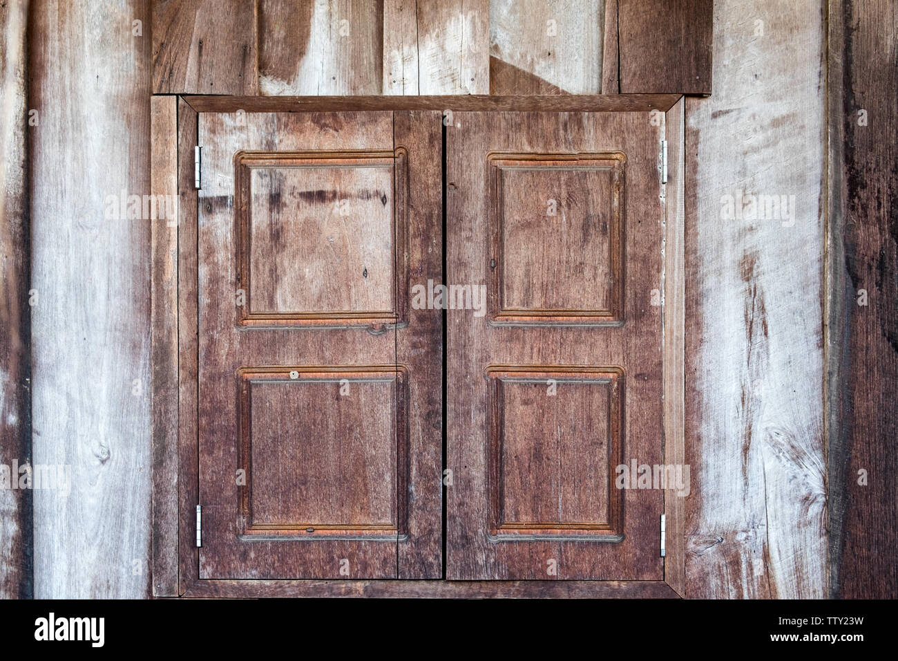 Old wooden wall and close window beside Stock Photo - Alamy