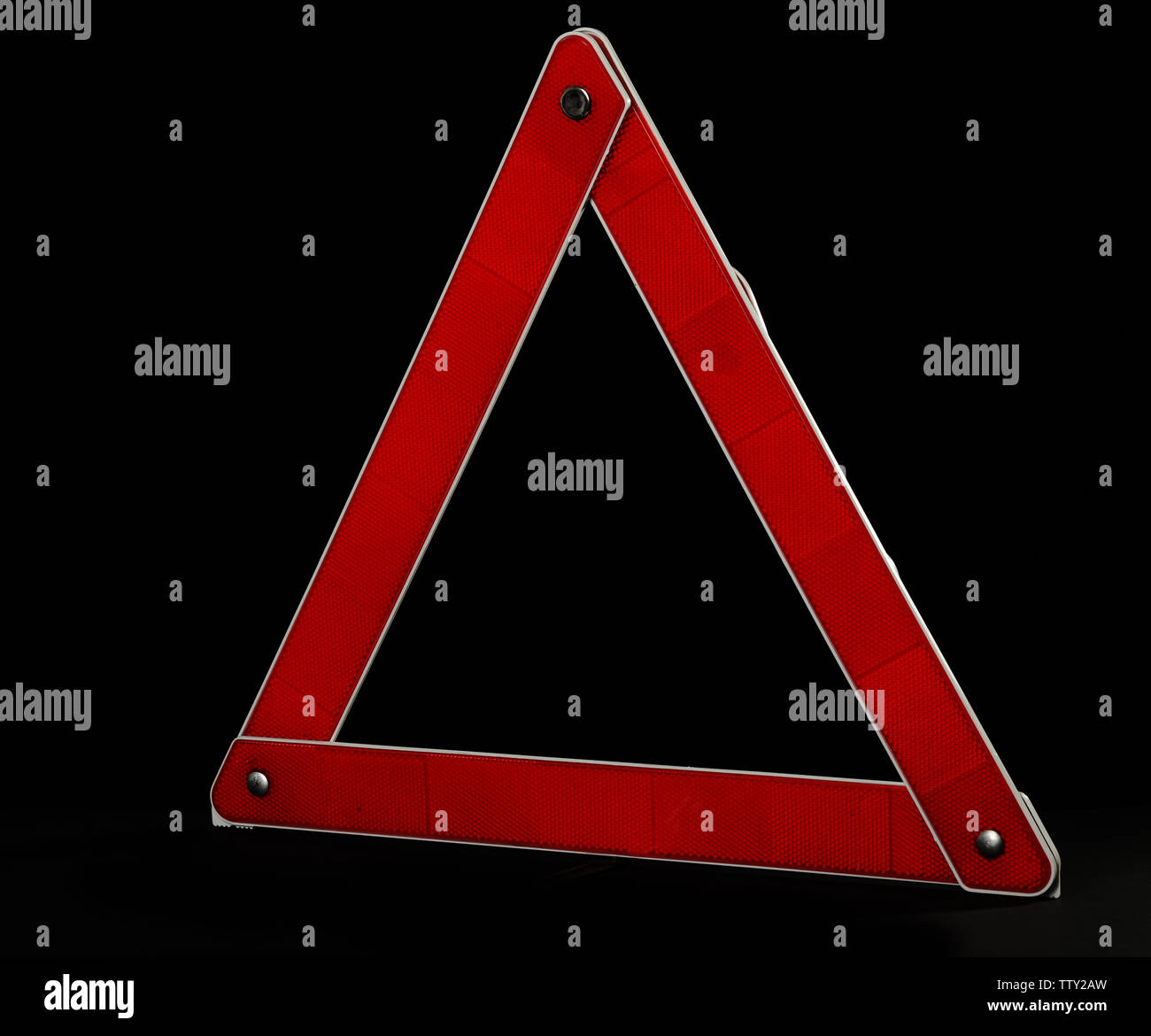 Emergency stop sign on black background Stock Photo - Alamy