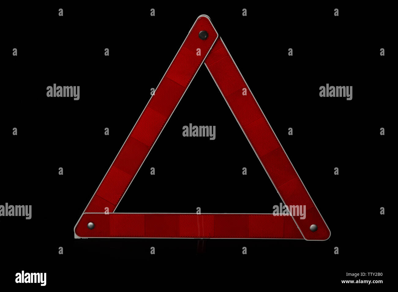 Emergency stop sign on black background Stock Photo - Alamy