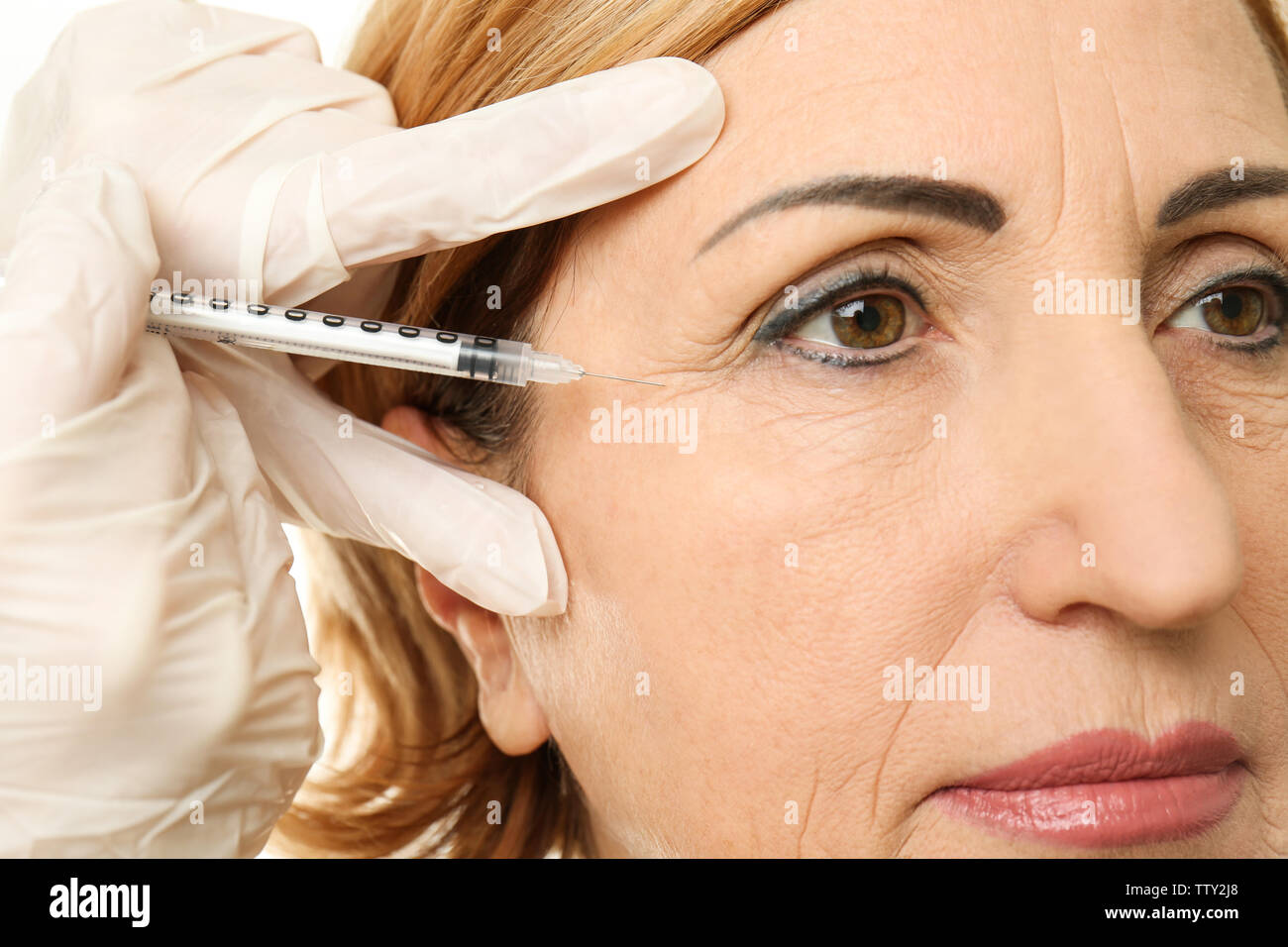 Hyaluronic acid injection for facial rejuvenation procedure Stock Photo ...