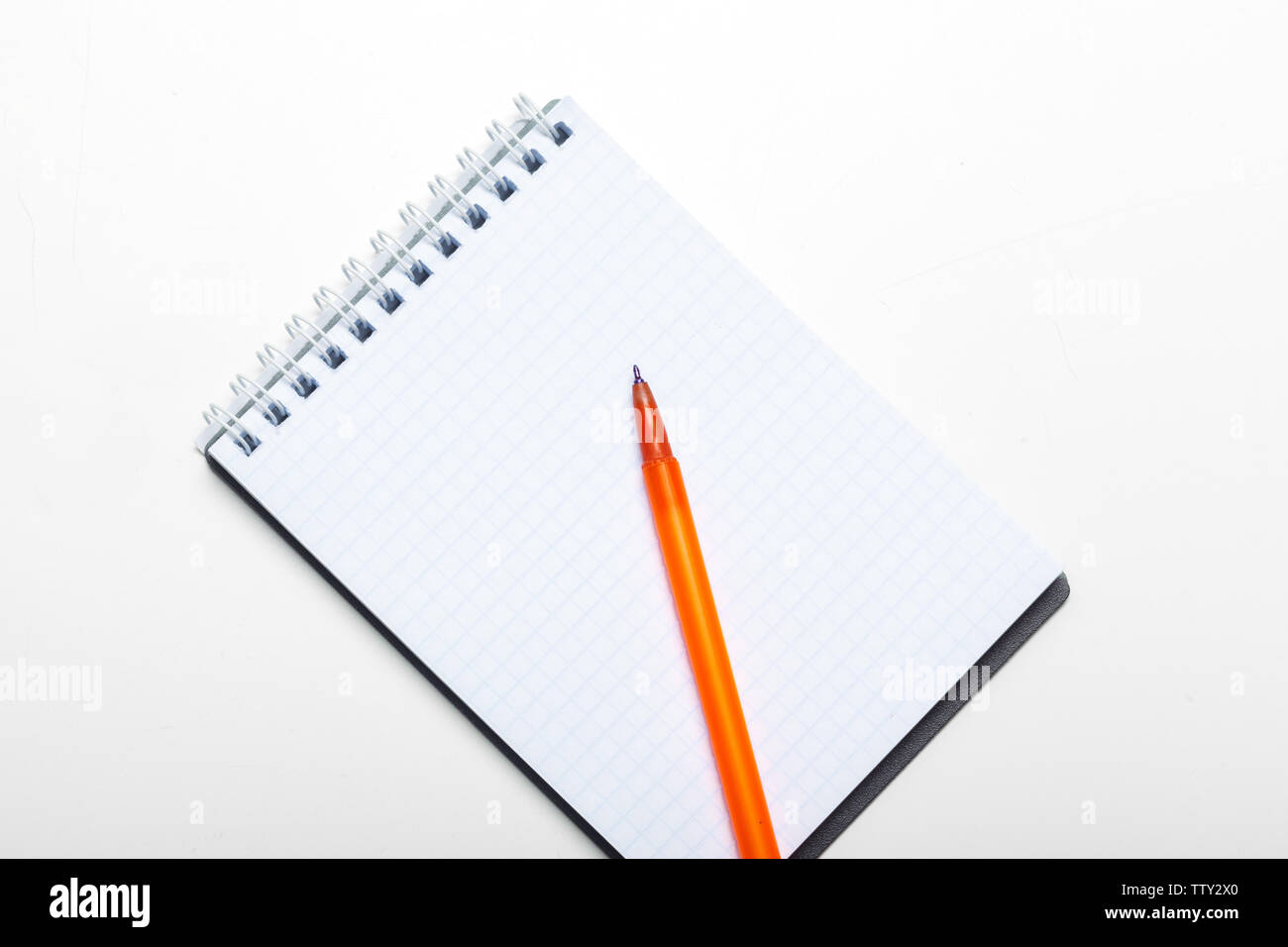 notepad notebook and ball pont pen isolated on white background Stock ...