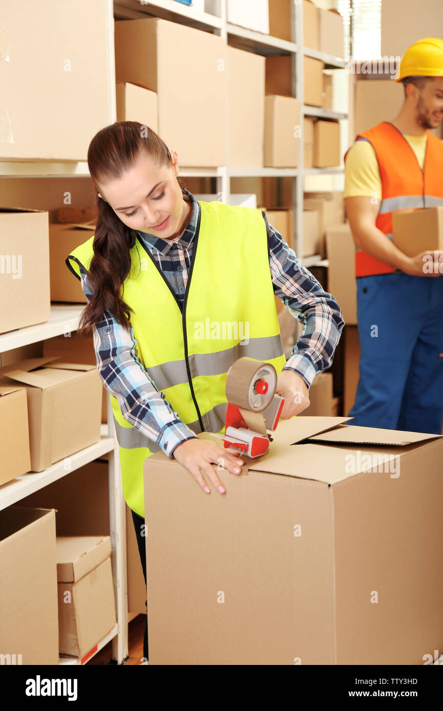 Business people working at warehouse Stock Photo - Alamy
