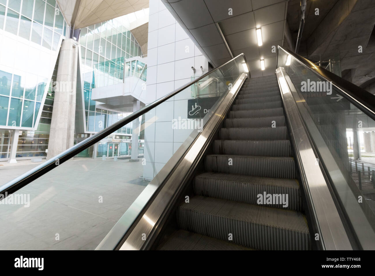 Modern escalator electronic system moving Stock Photo - Alamy