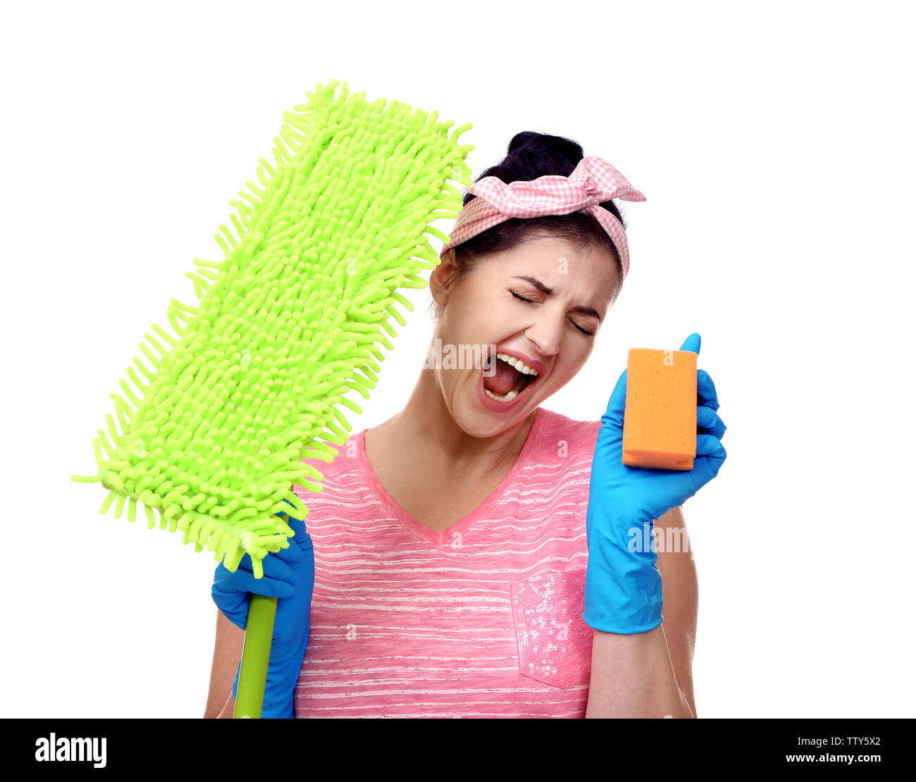 Happy young cleaner with dust mop and sponge on white background Stock ...