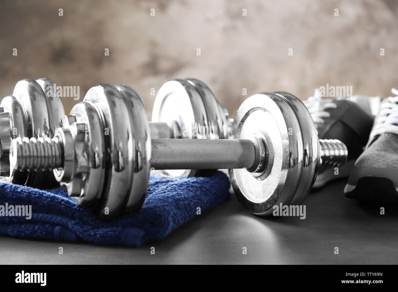 Sports concept. Workout objects on grey background Stock Photo - Alamy